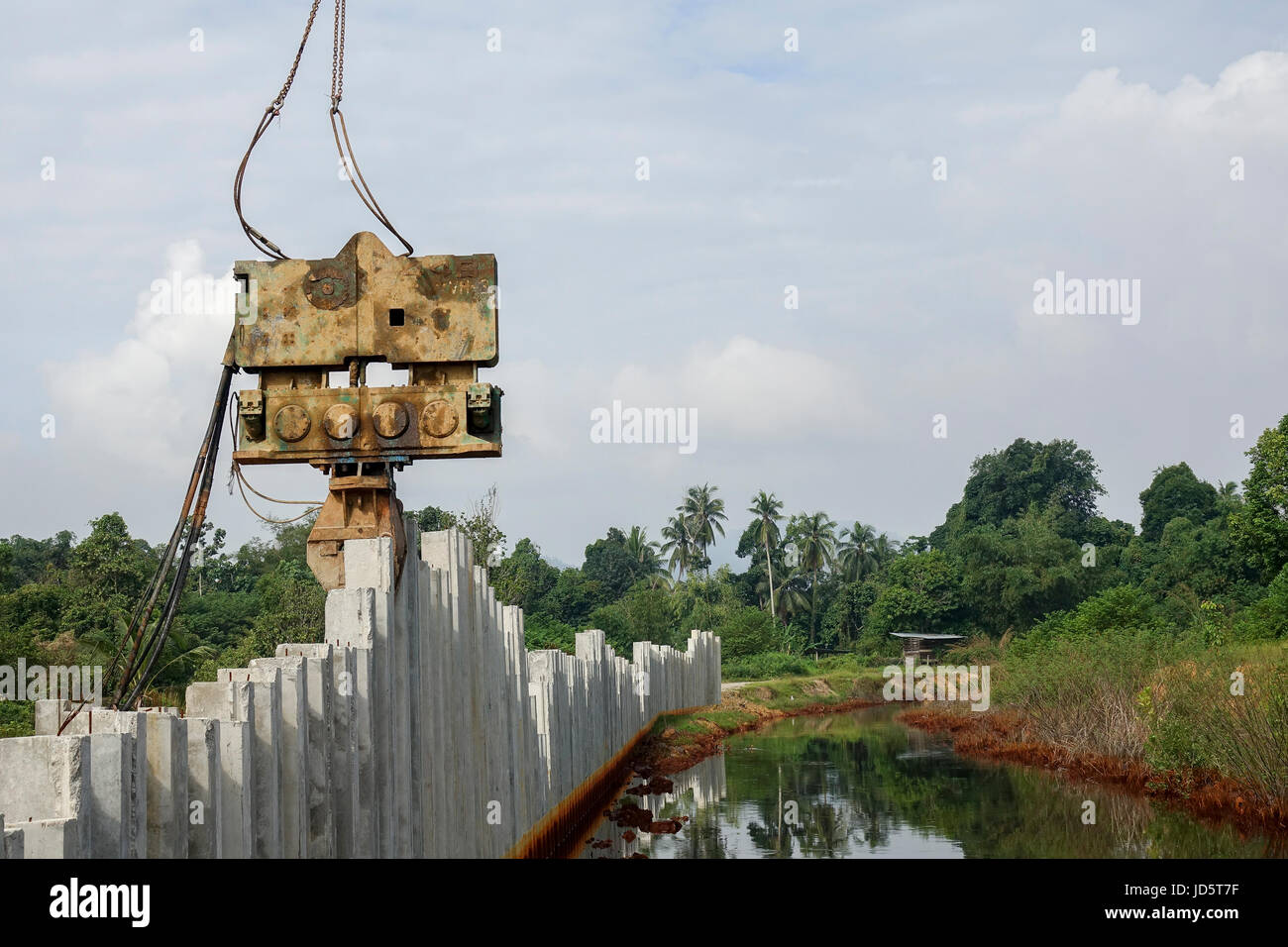 Piling machine works on a bridge pile construction Stock Photo - Alamy