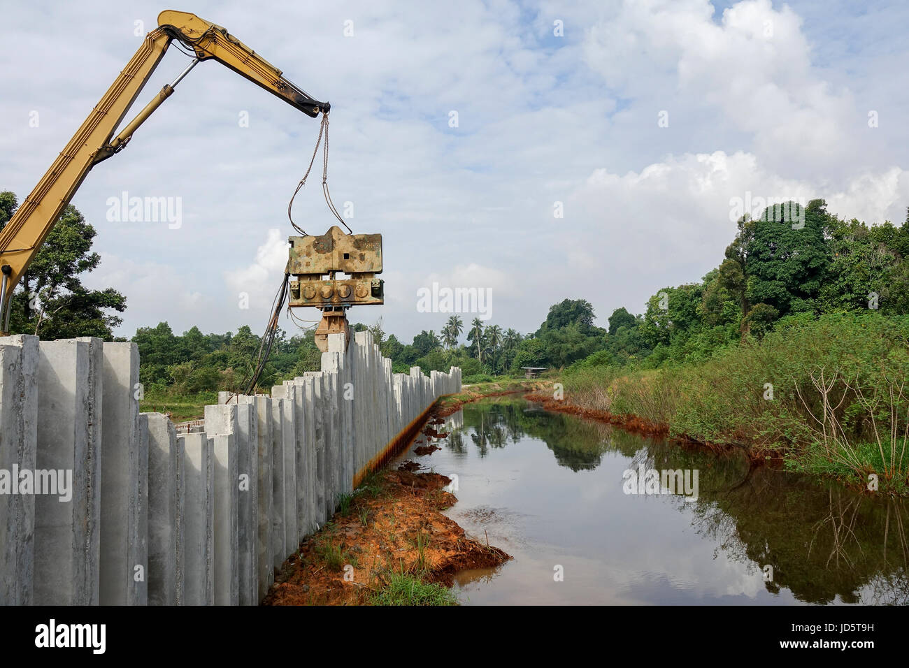 Piling machine works on a bridge pile construction Stock Photo - Alamy