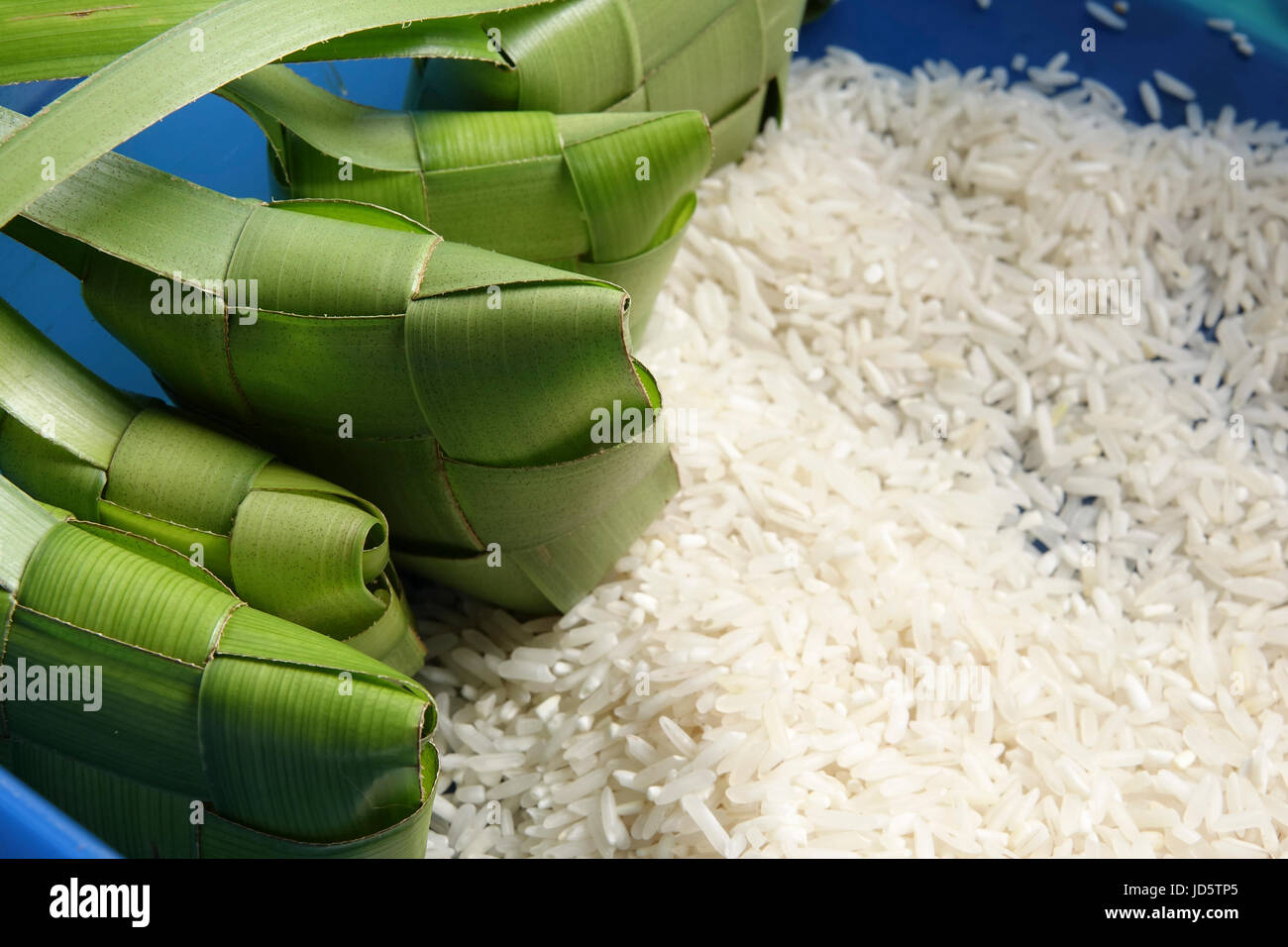 Making dumpling rice (ketupat nasi Stock Photo - Alamy
