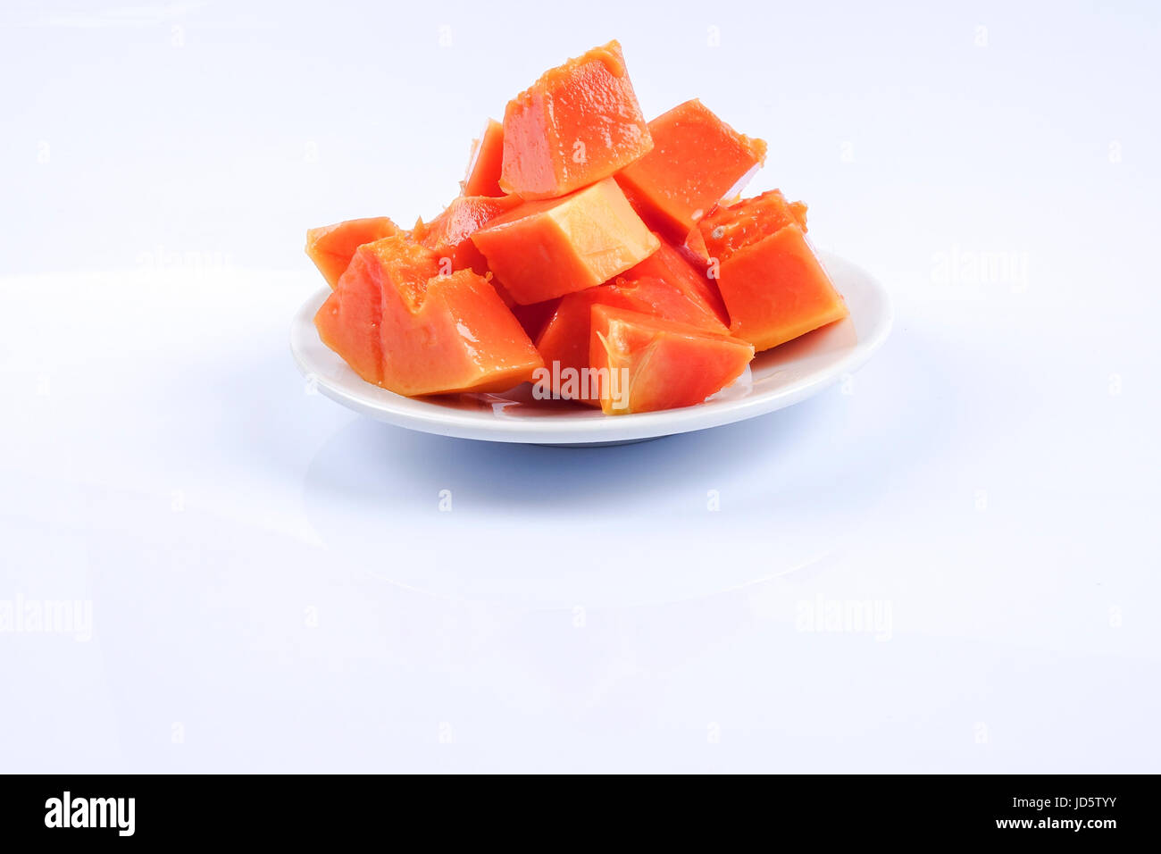slice papaya isolated on white background. Top view Stock Photo - Alamy