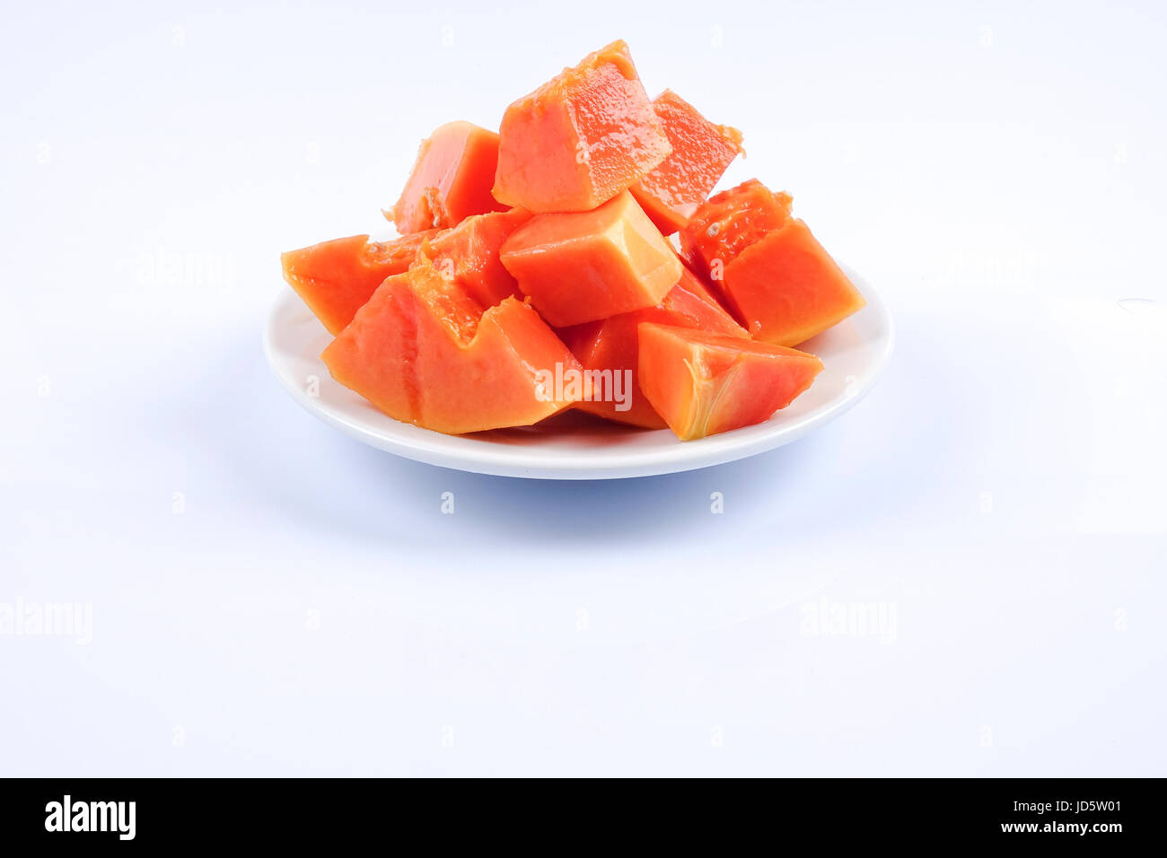 slice papaya isolated on white background. Top view Stock Photo - Alamy