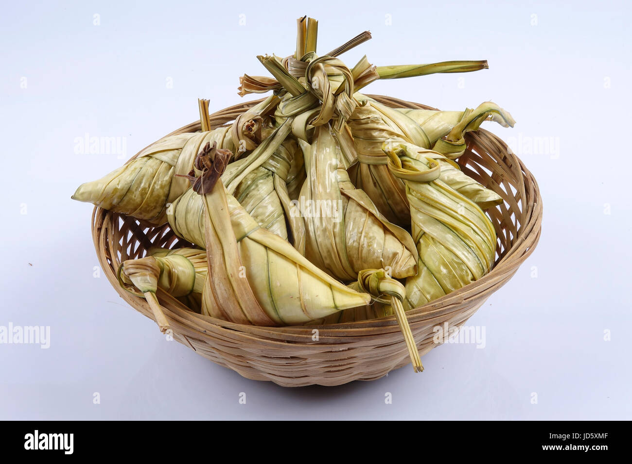 Ketupat (Rice Dumpling) On white Background. Ketupat is a natural rice ...