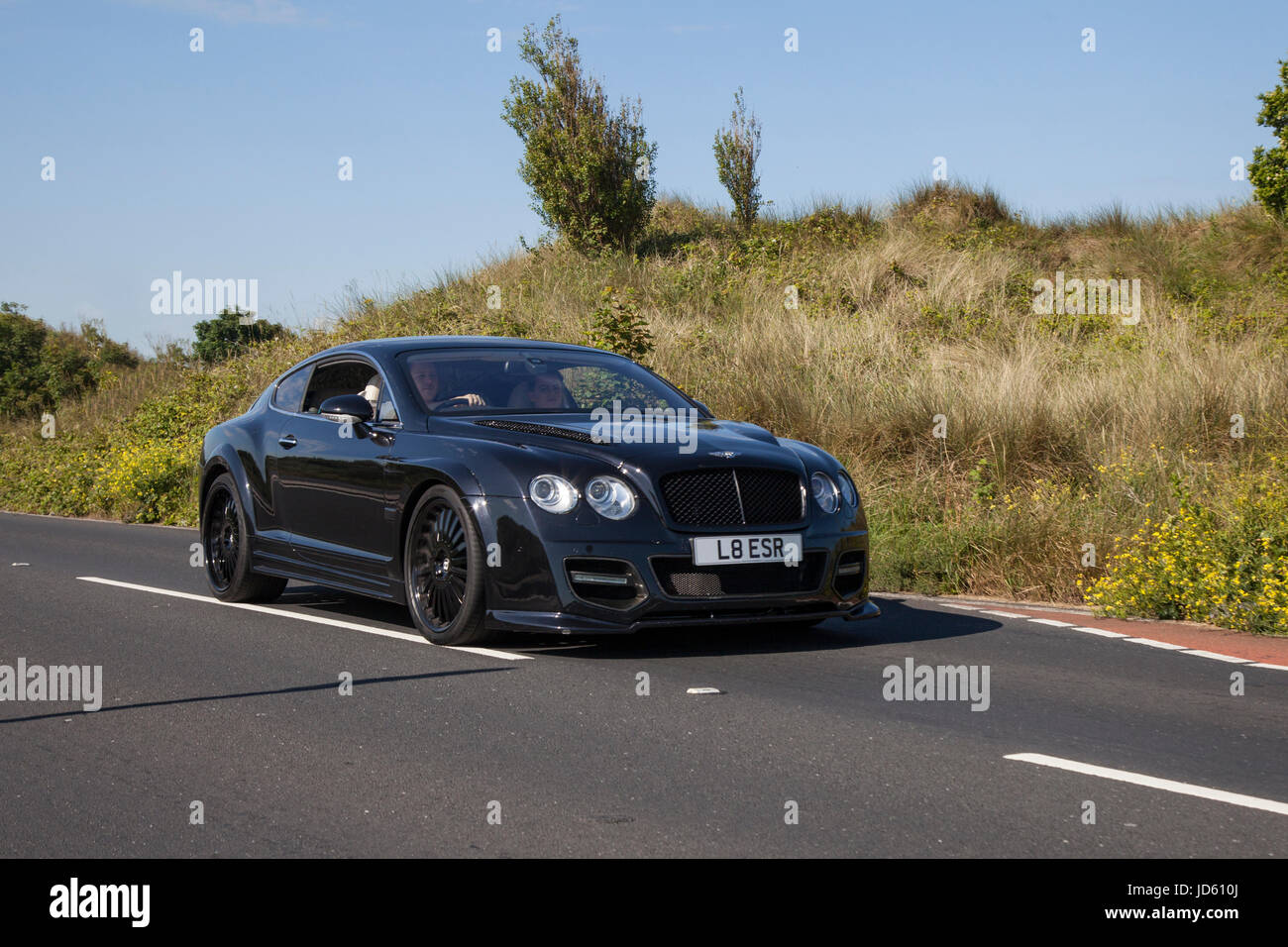 Black Bentley Continental GT Speed A grand tourer arriving for the ...