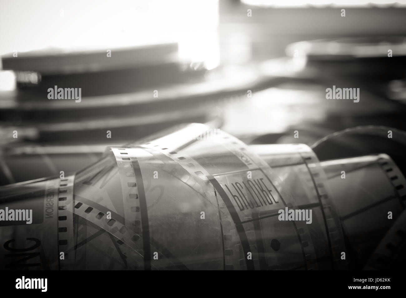 Aged vintage 35 mm film reel, old movie symbol, header filmstrip ...