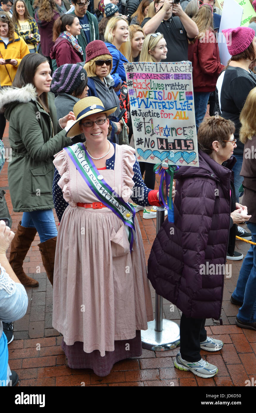 ANN ARBOR, MI - JAN 21: A protester dressed as a suffragette ...
