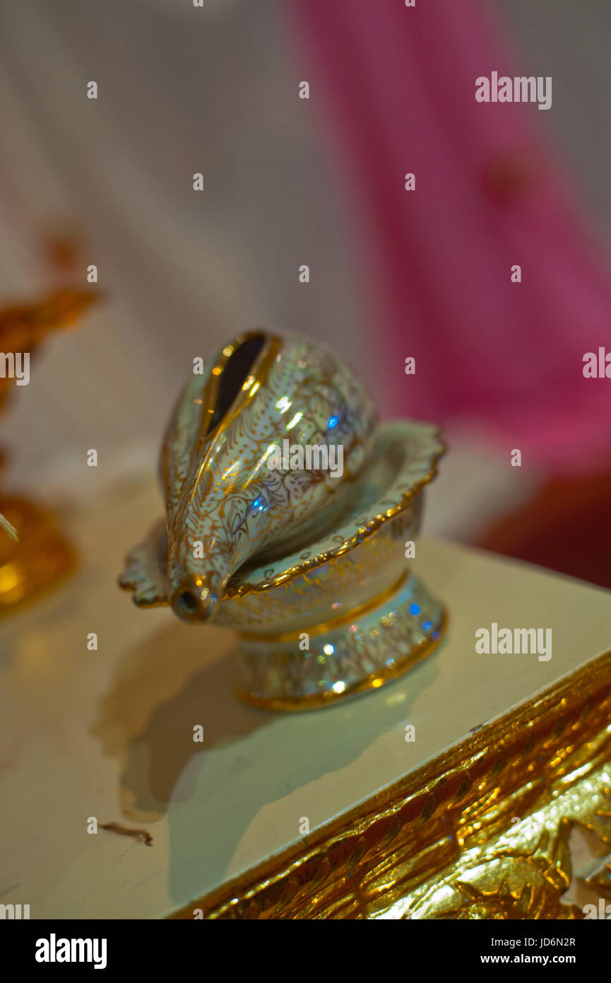 Conch shell on golden in Thai wedding ceremony Stock Photo - Alamy