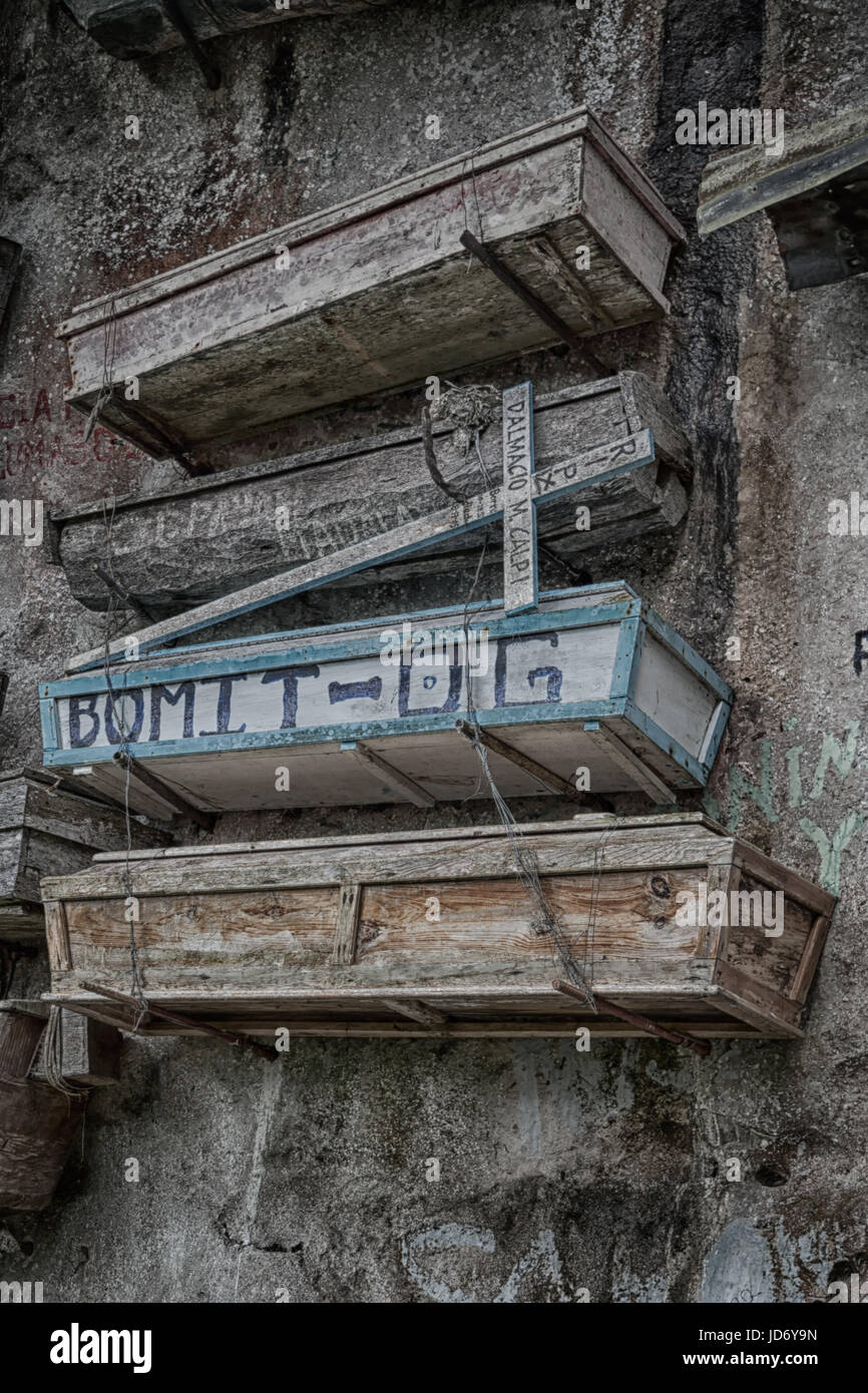 in philipphines the typical hanging cemetery in the mountain cliff ...