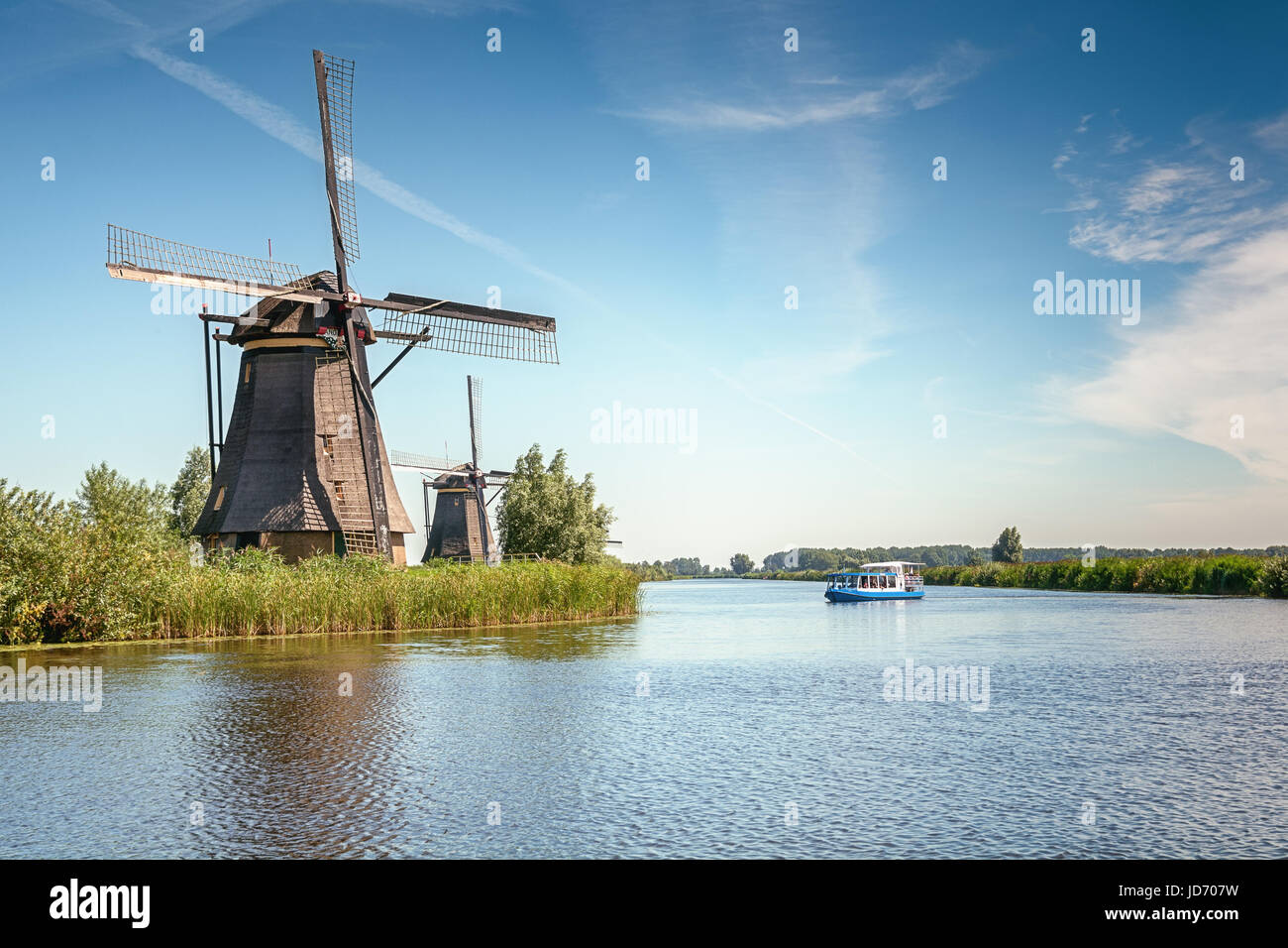 Boat trip on the canal at one of the mills at Kinderdijk. The ...
