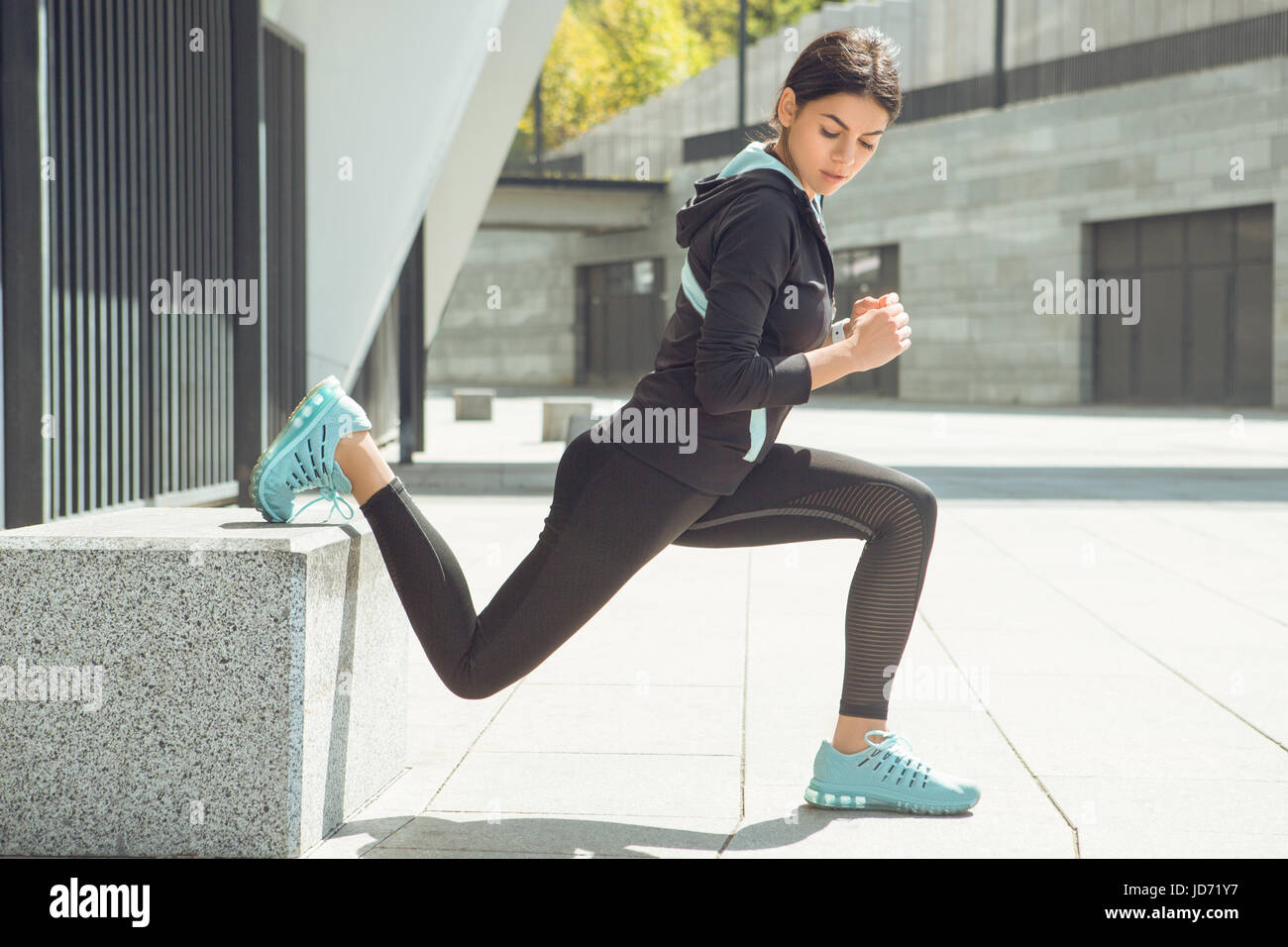 Young femaleactive exercise workout on street outside Stock Photo - Alamy