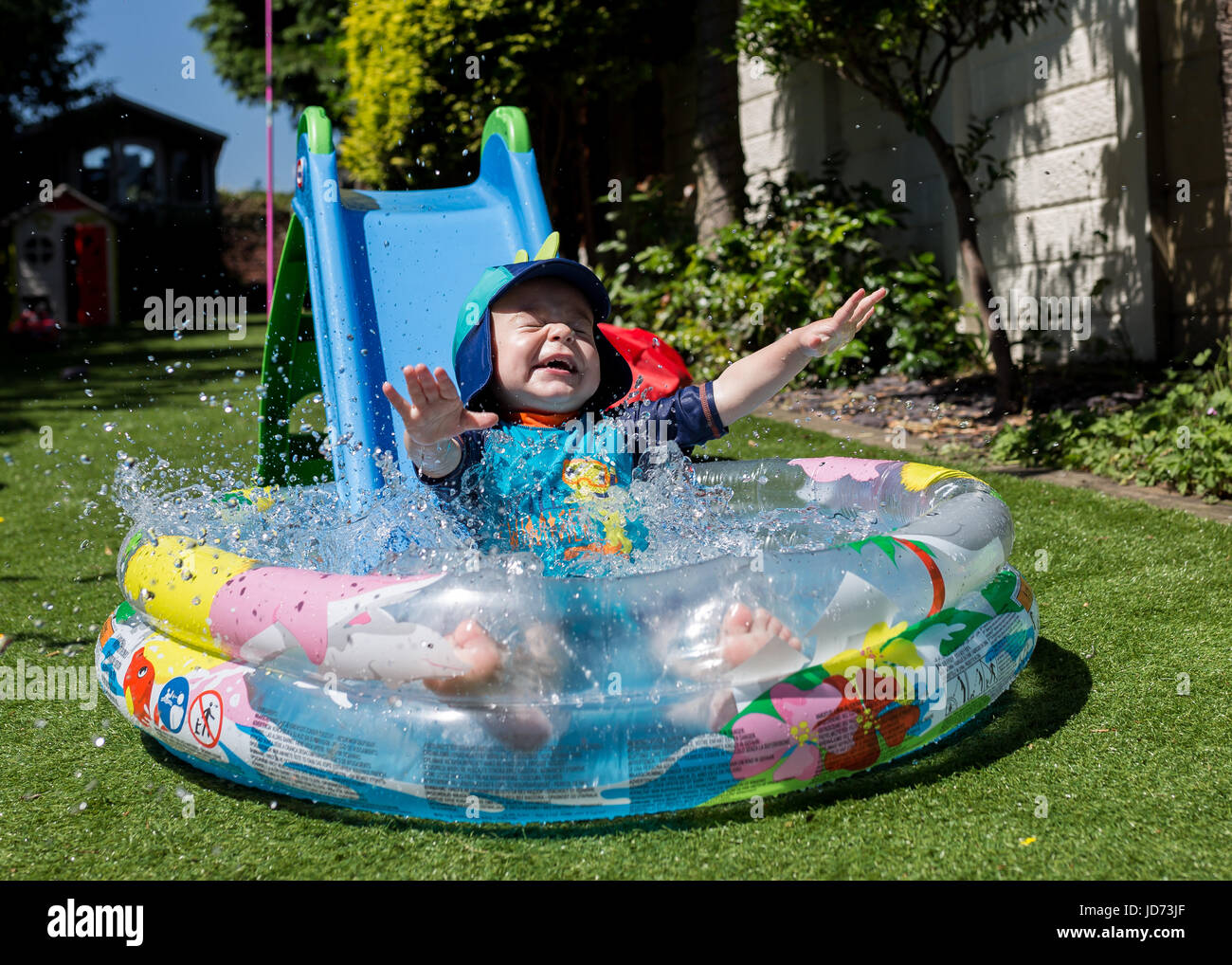 Playing paddling hi-res stock photography and images - Alamy