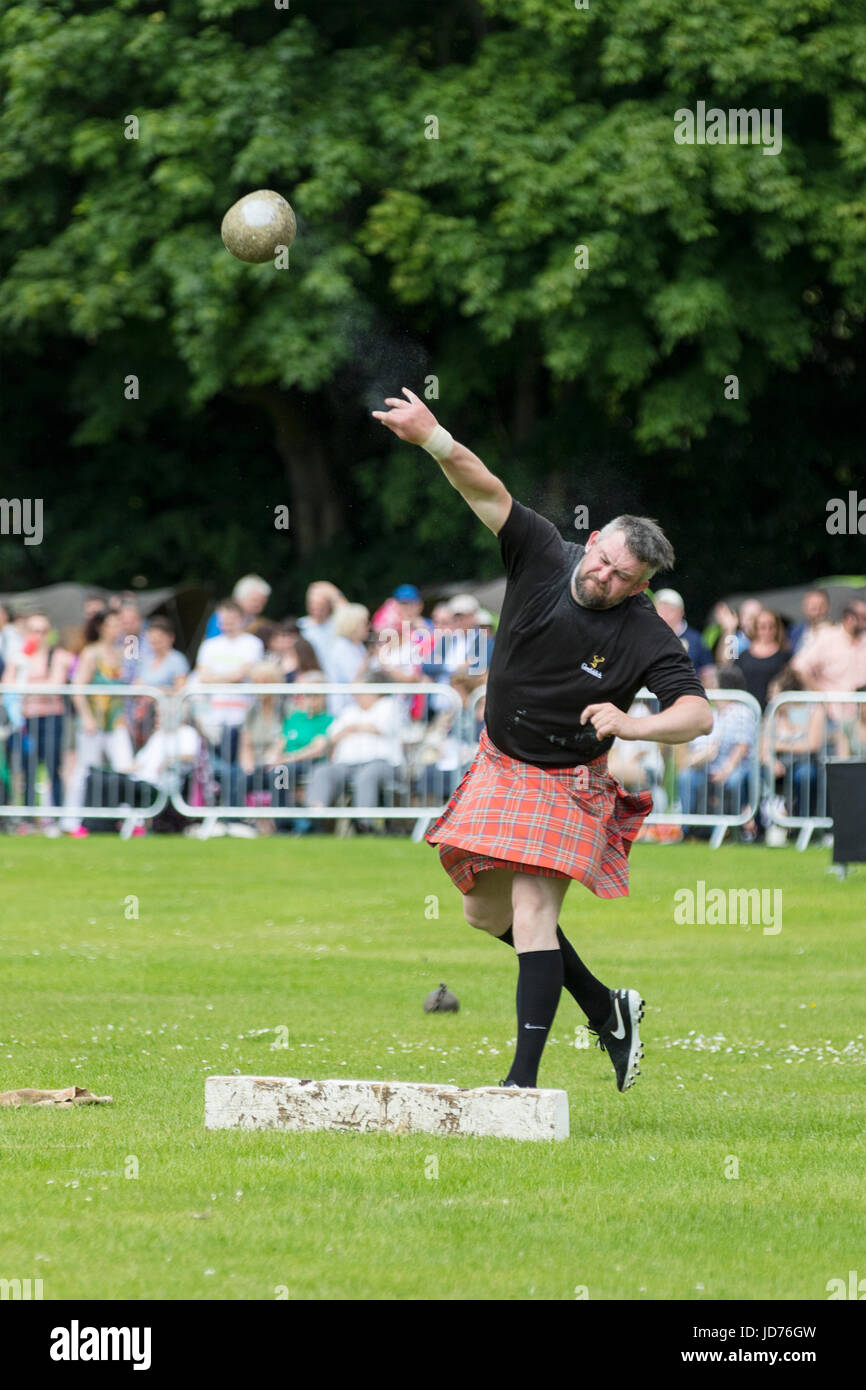 Aberdeen, Scotland - Jun 18, 2017: A competitor in the stone putting ...