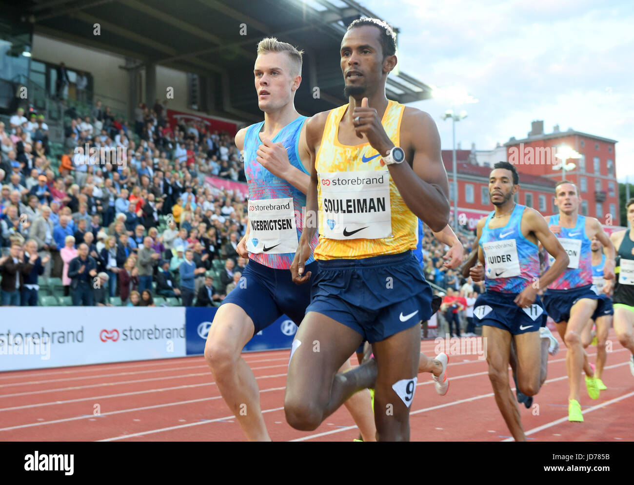 Filip Ingebrigtsen (NOR) and Ayanleh Souleiman (DJI) run in the 1,500m ...