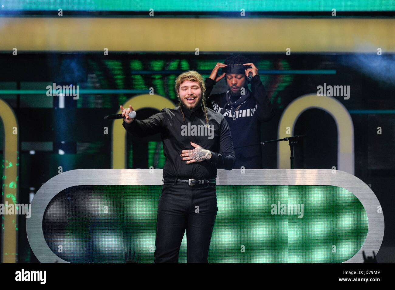 Toronto, Canada. 18th June, 2017. Post Malone performing on stage at ...