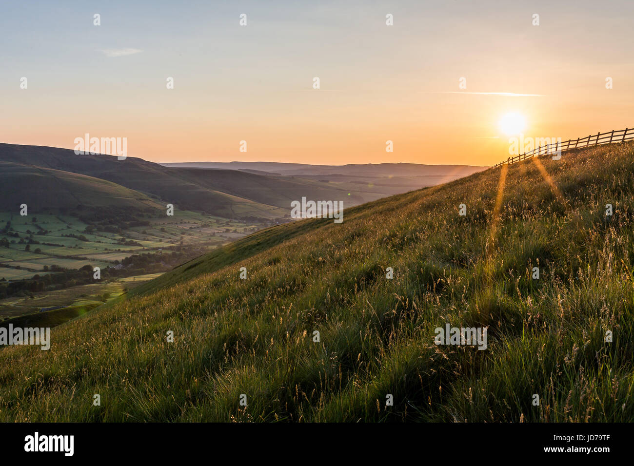 A colourful sunrise over Mam Tor ridge. Mam Tor, Peak District National ...