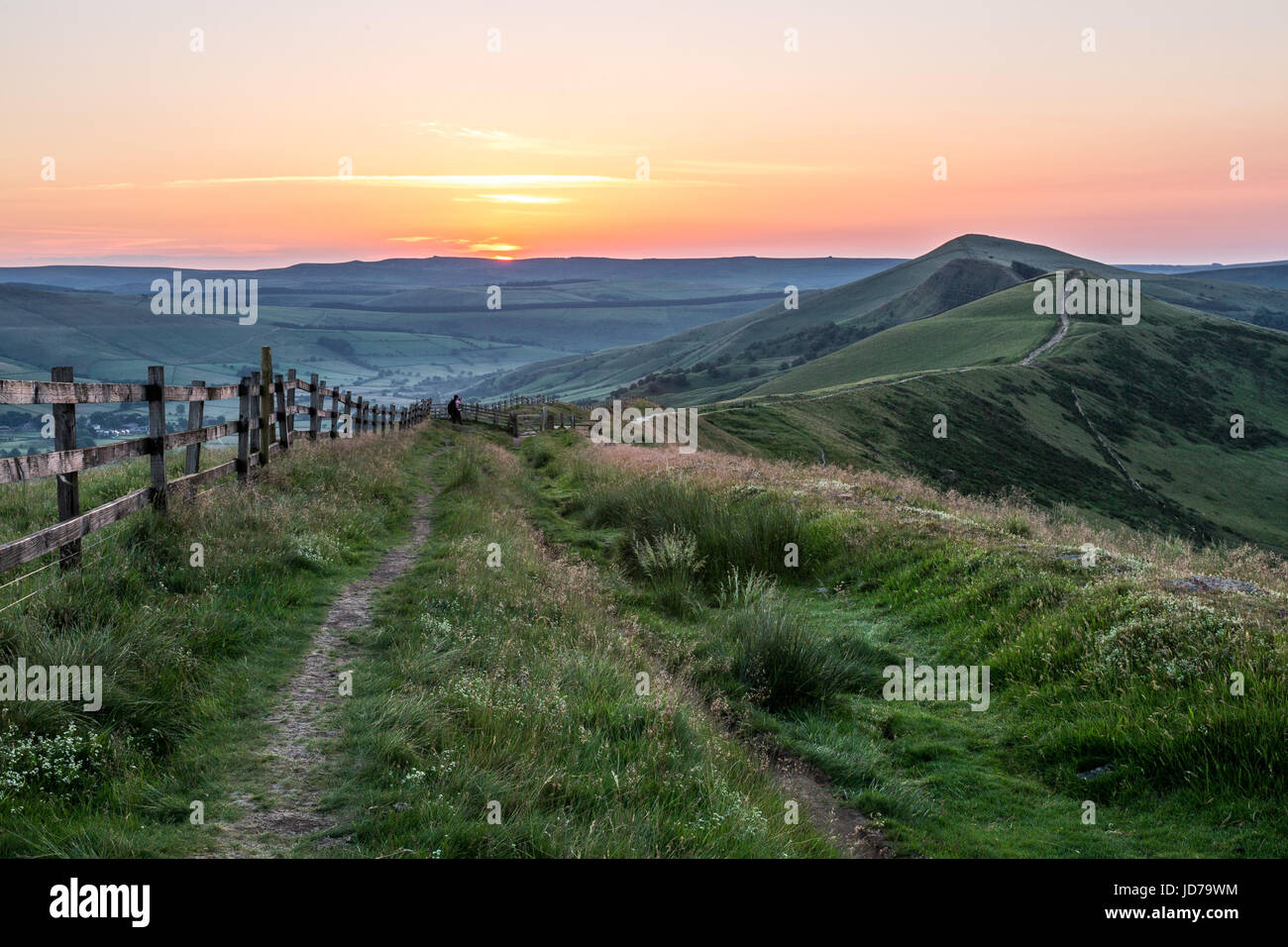 A colourful sunrise over Mam Tor ridge. Mam Tor, Peak District National ...