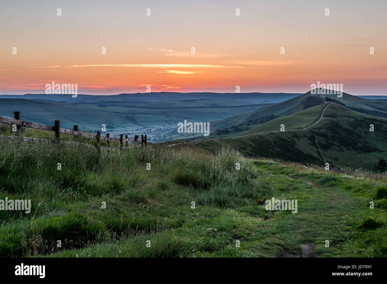 A colourful sunrise over Mam Tor ridge. Mam Tor, Peak District National ...