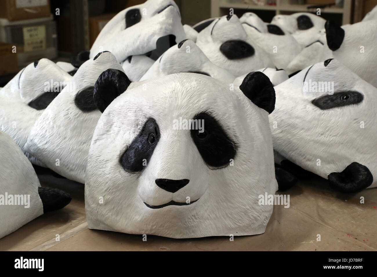 Saitama, Japan. 19th June, 2017. Rubber masks shaped giant panda are ...