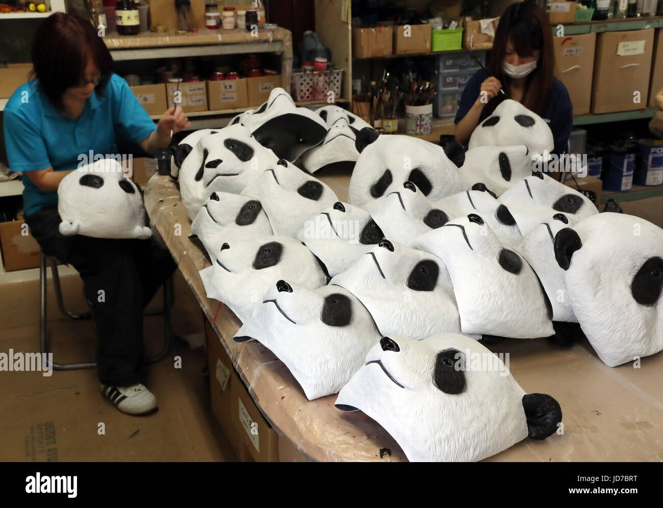 Saitama, Japan. 19th June, 2017. Employees of Japanese toy mask maker ...