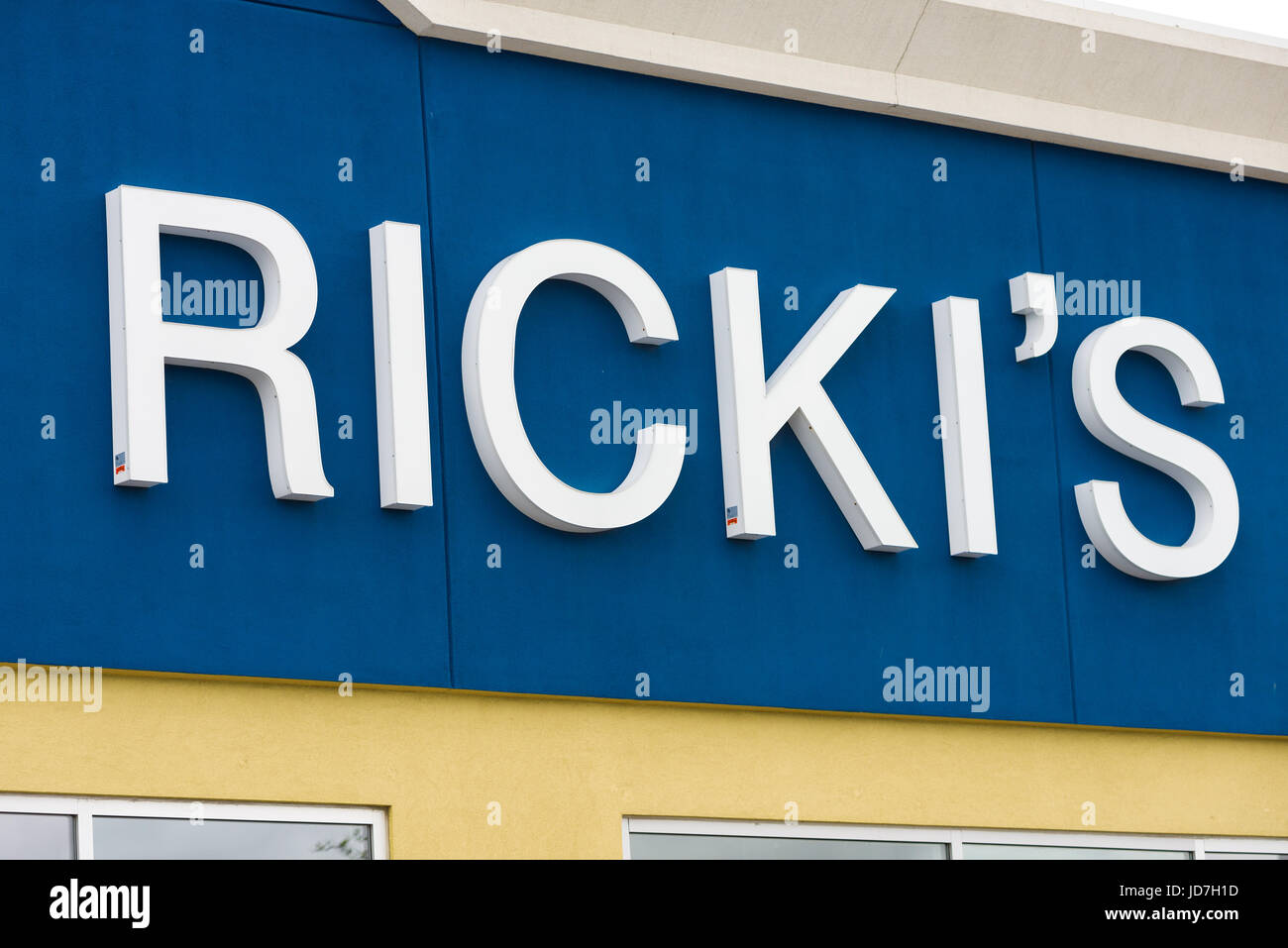 Ricki's Brand Logo On Building Exterior Stock Photo - Alamy