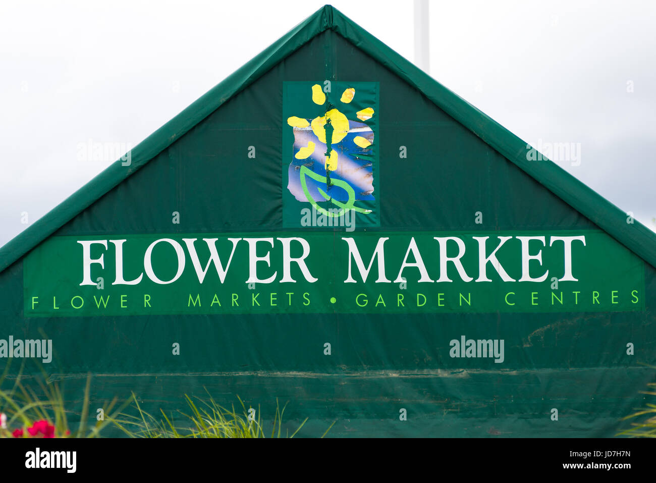 Flower Market Brand Logo On Building Exterior Stock Photo - Alamy