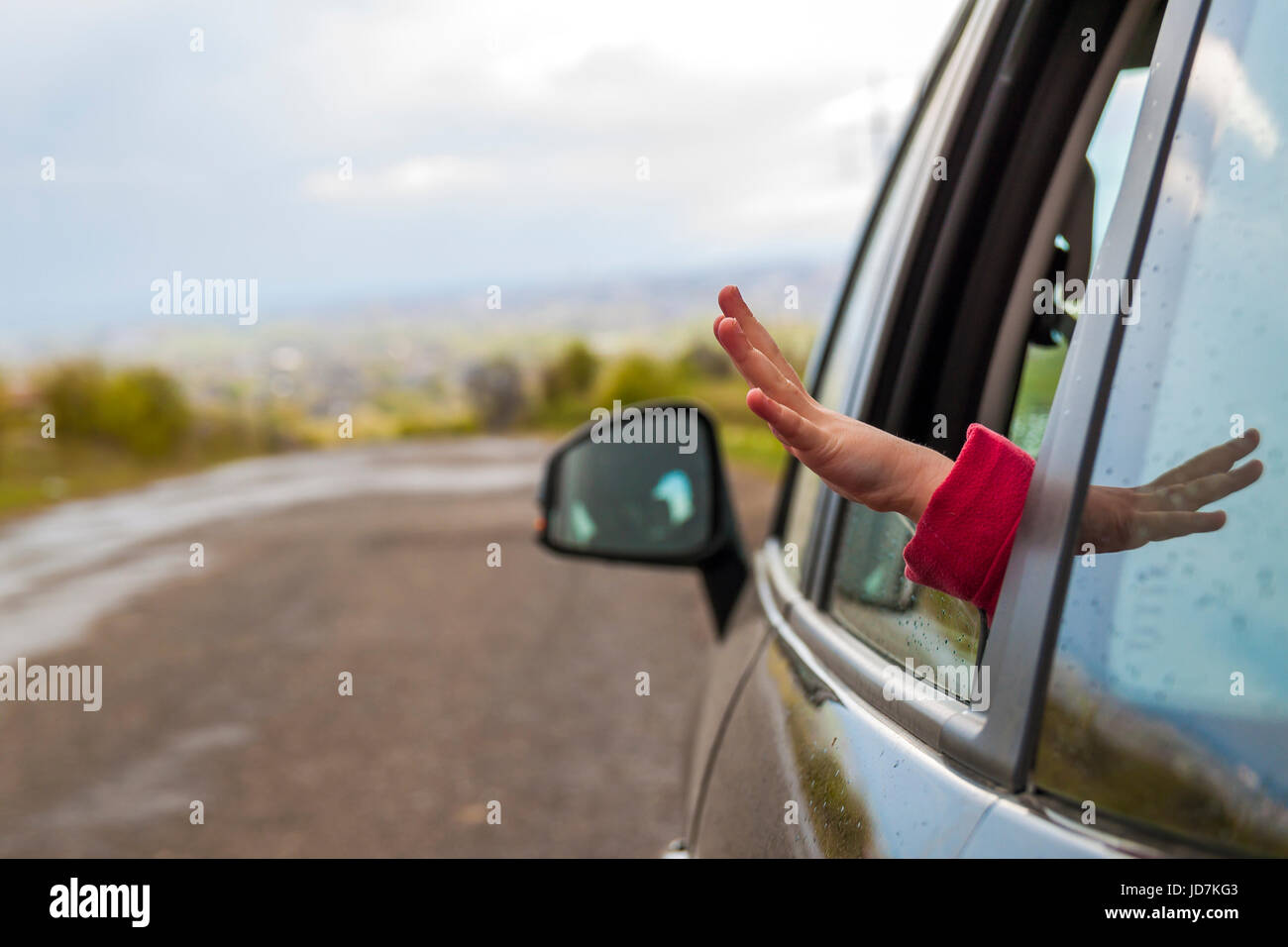 Child hands in a car window during travel to vacation Stock Photo - Alamy