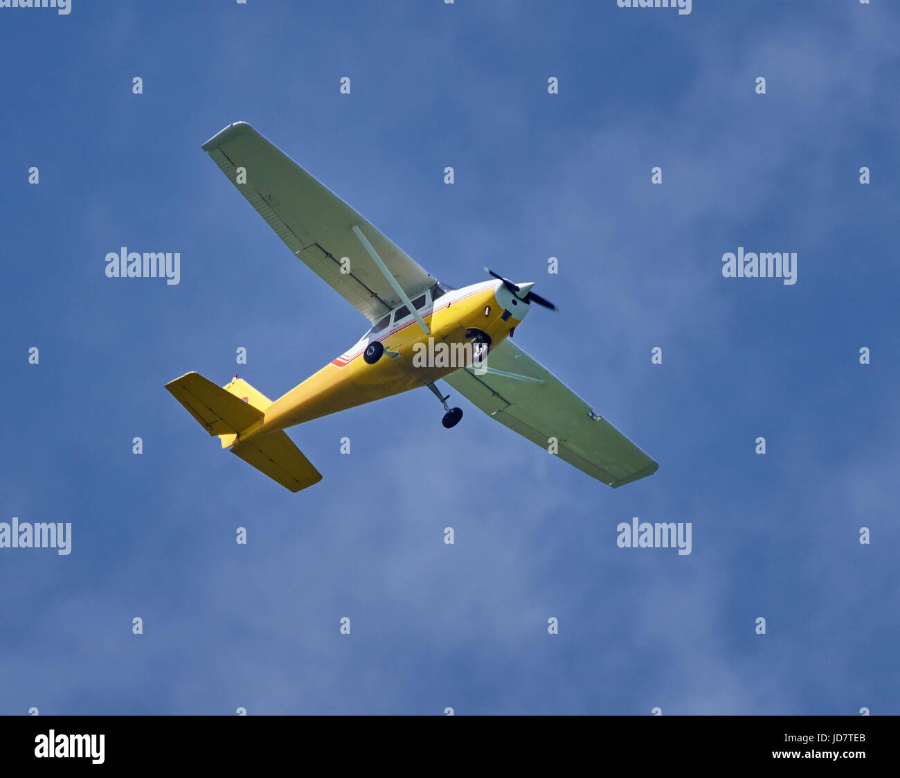 Propeller light personal airplane in flight against the sky Stock Photo ...