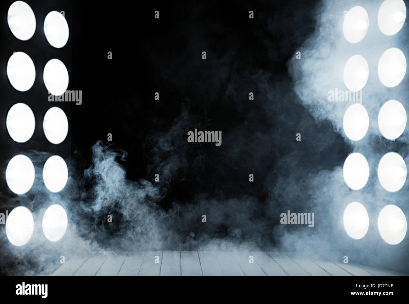 Dark interior, a wooden stage between two powerful light columns Stock ...