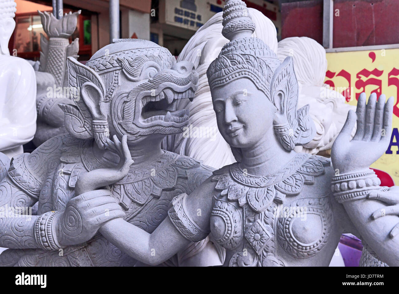 Devil chasing young girl marble statues Phnom Penh Cambodia Stock Photo ...