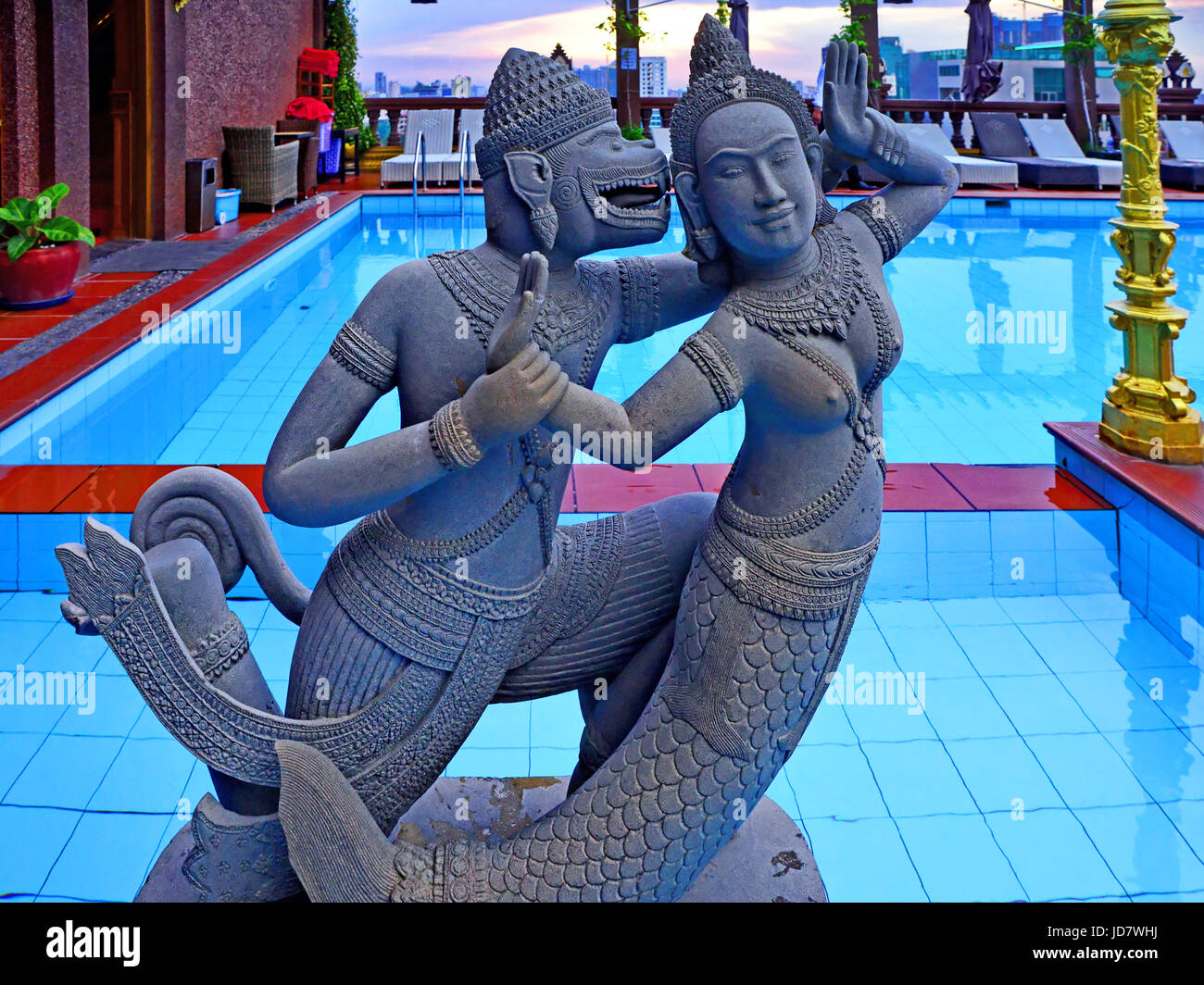 Swimming pool gods OK Boutique Hotel Phnom Penh Cambodia Stock Photo ...