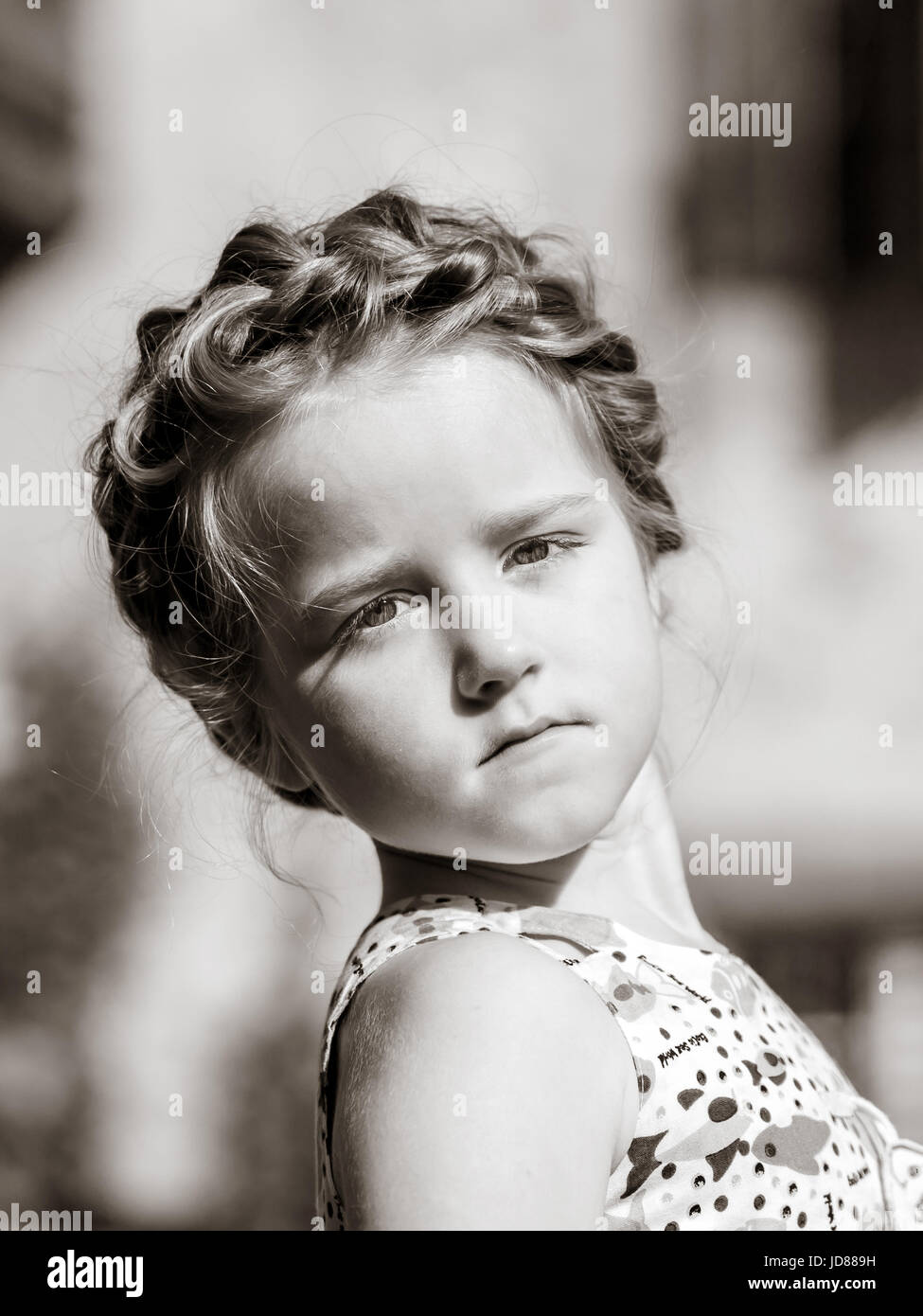 Cute little preschooler girl natural portrait on the sun, hairdress ...