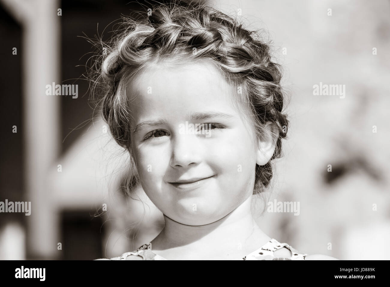 Cute little preschooler girl natural portrait on the sun, hairdress ...