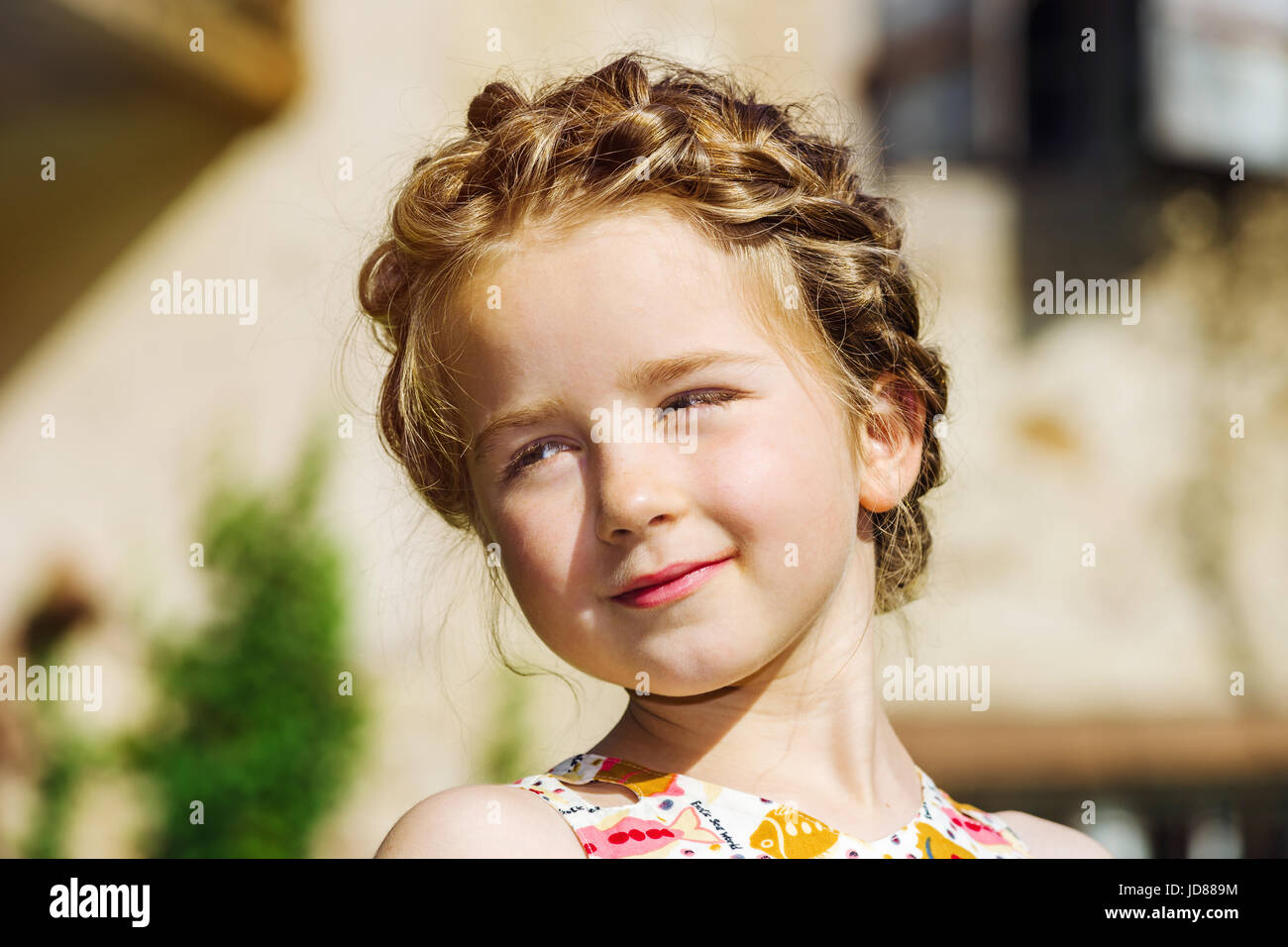 Cute little preschooler girl natural portrait on the sun, hairdress ...