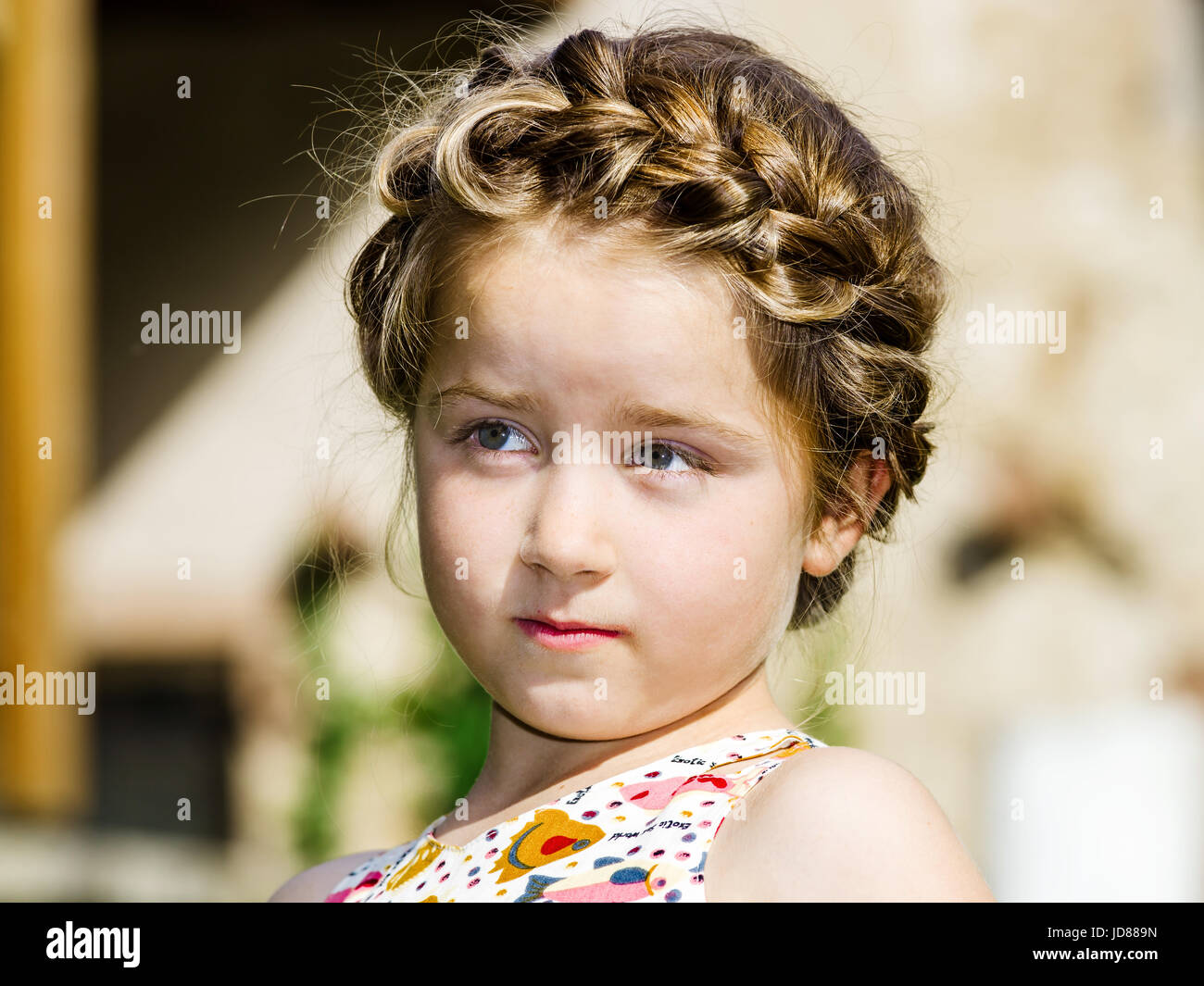 Cute little preschooler girl natural portrait on the sun, hairdress ...