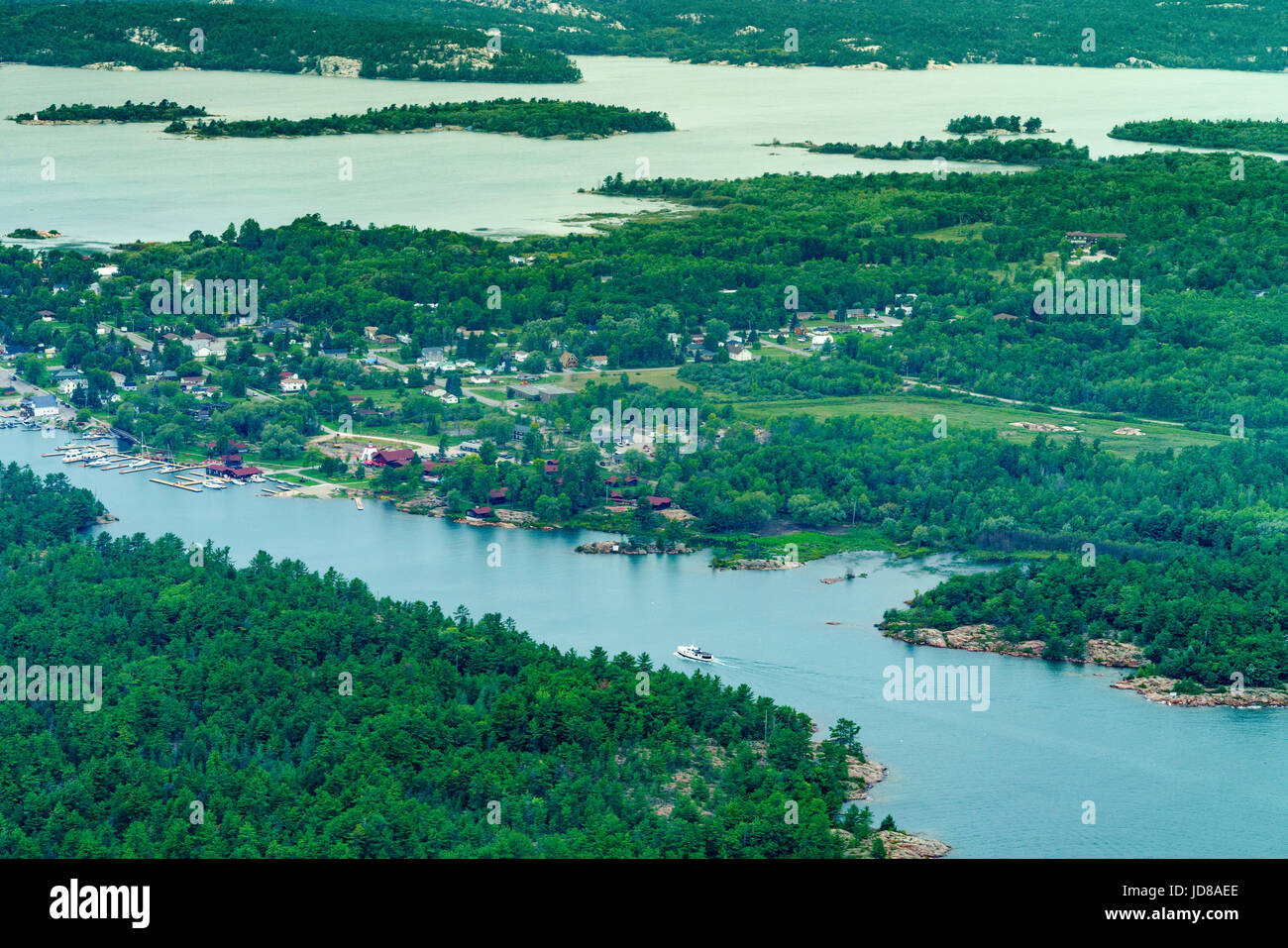 Aerial view houses and trees along coastline, Toronto, Ontario, Canada ...