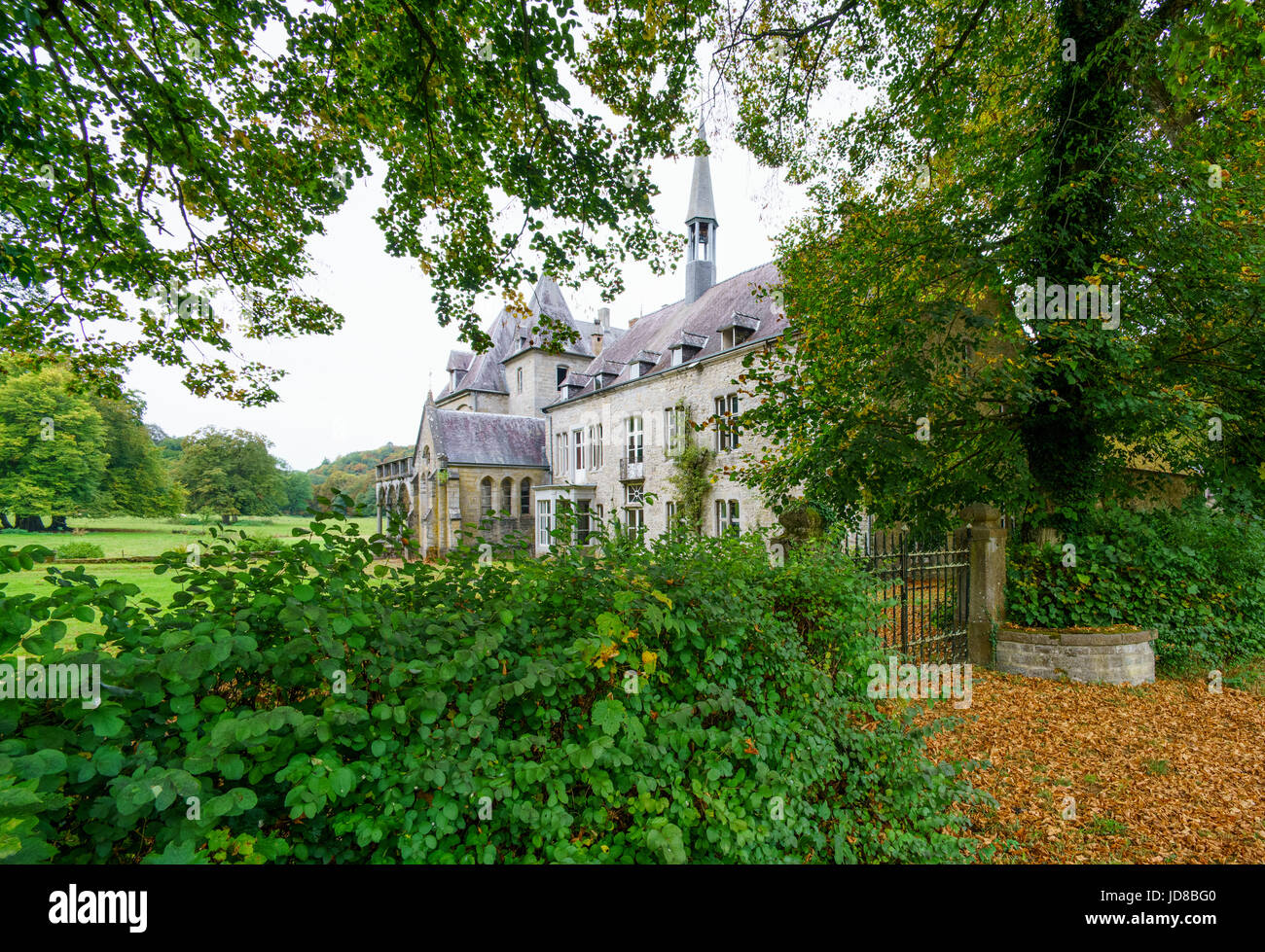 Large country house with trees and shrubs in the foreground, Belgium ...