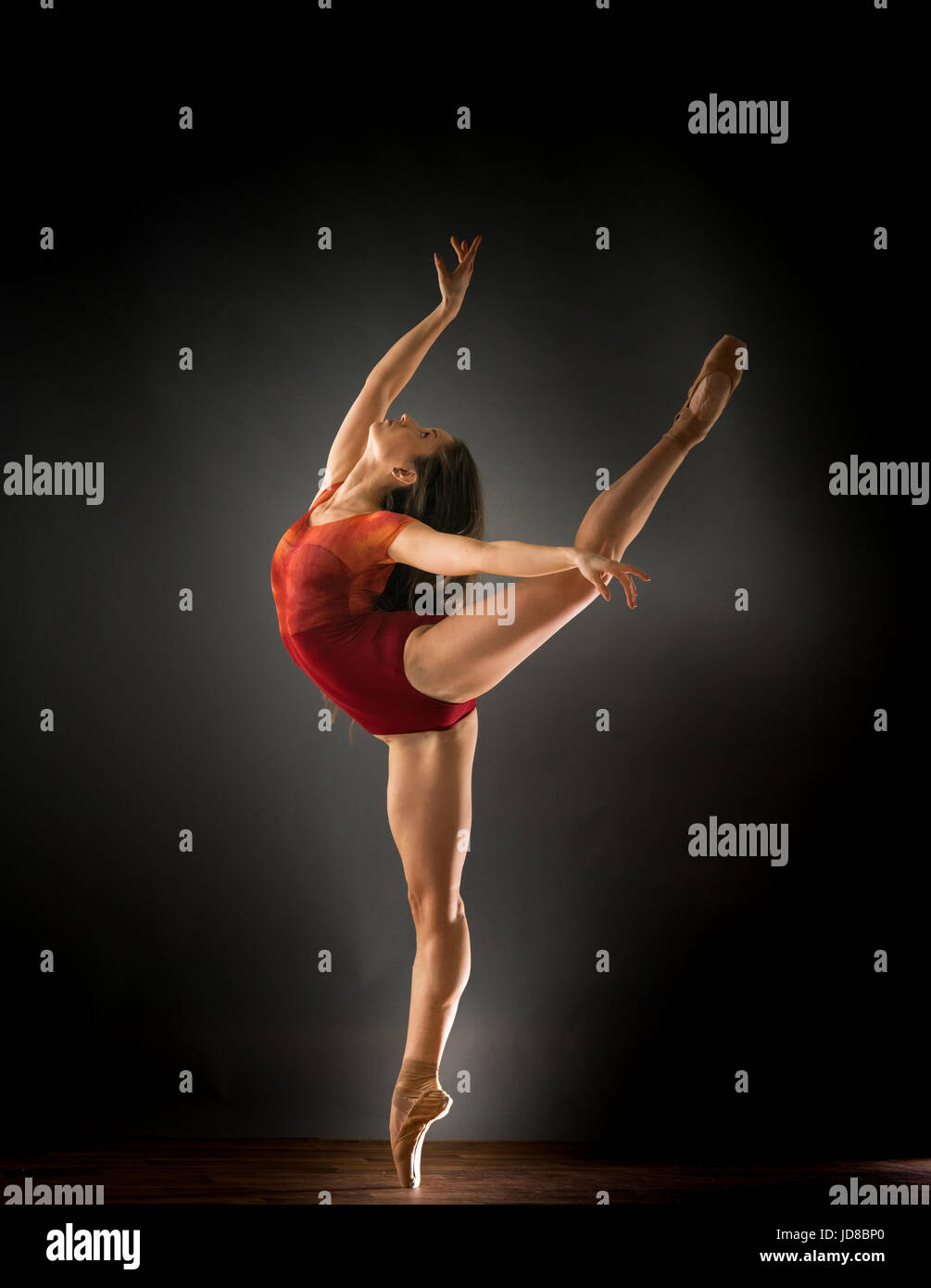 Female Ballet Dancer On One Leg With Arms Stretched Hi Res Stock