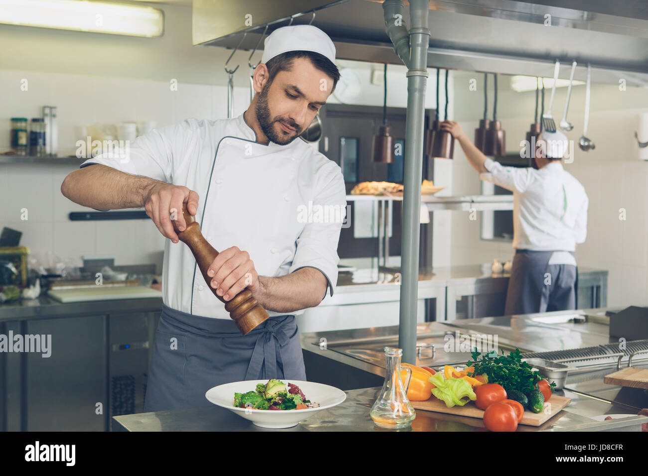 Male japanese restaurant chef cooking in the kitchen season dish Stock ...