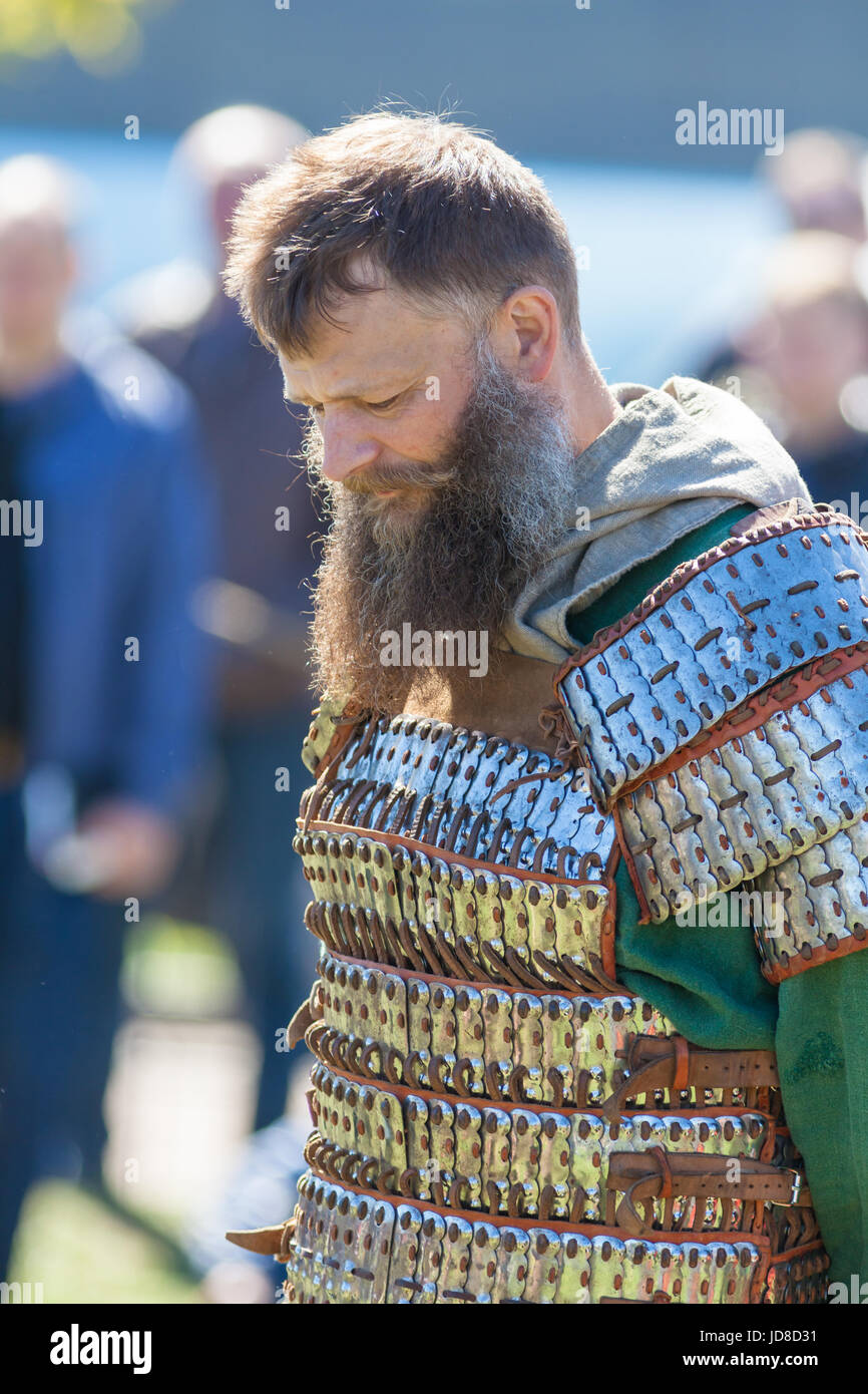 Man in plate armor at the festival `Legends of the Norwegian Vikings ...