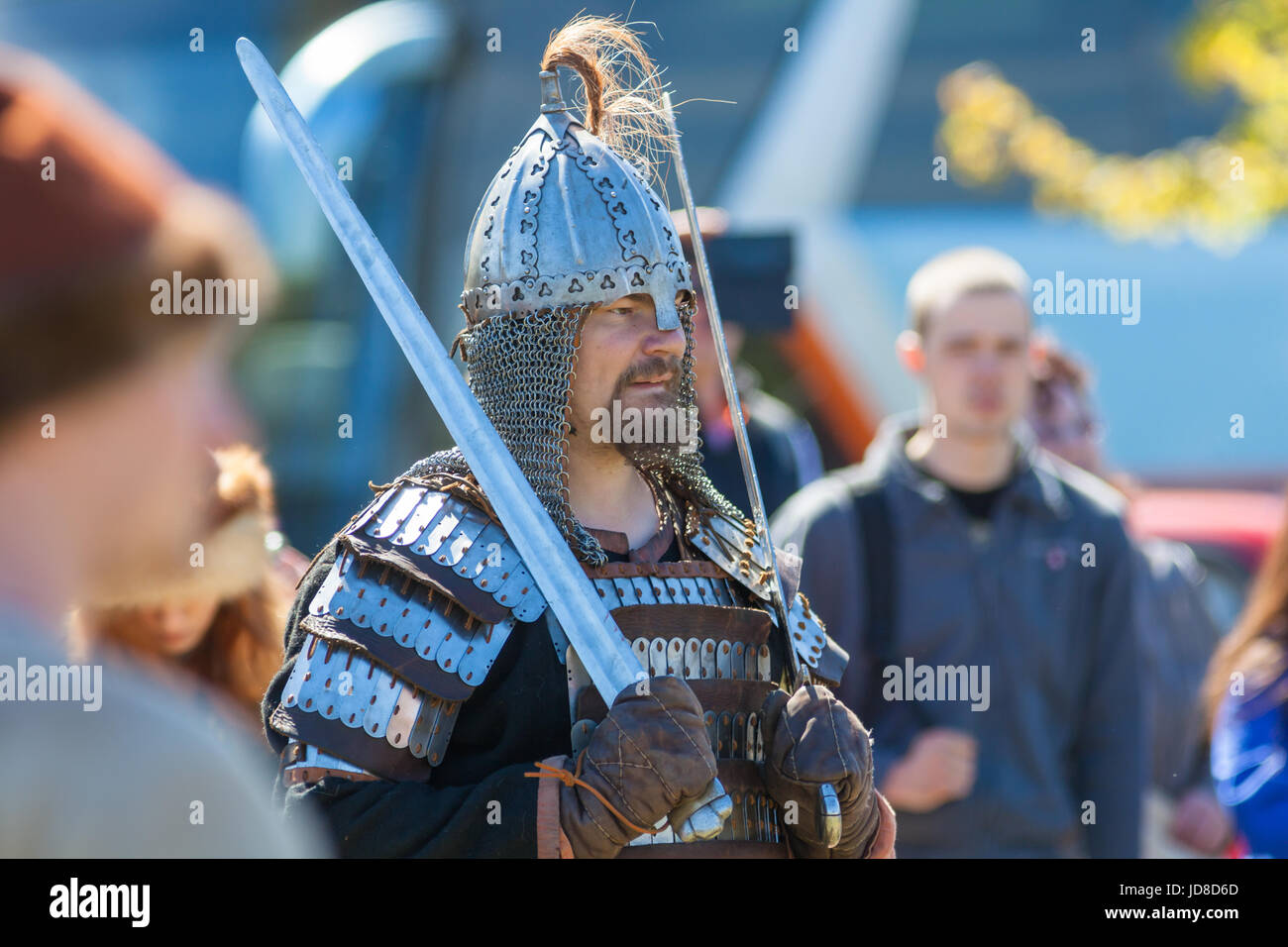 Swordsman in armor at the festival `Legends of the Norwegian Vikings ...
