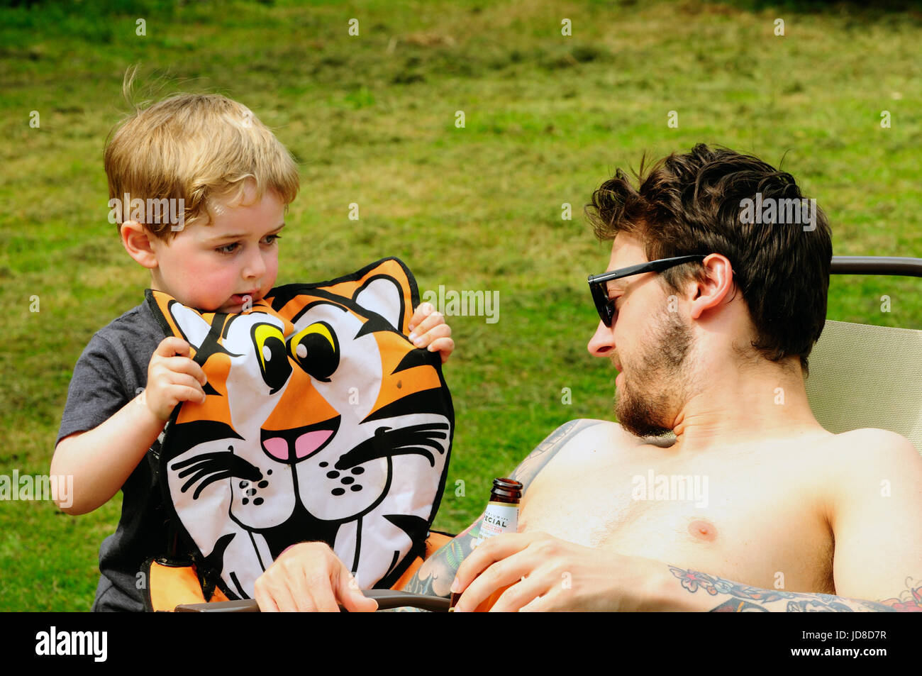 Uncle nephew talking hi-res stock photography and images - Alamy