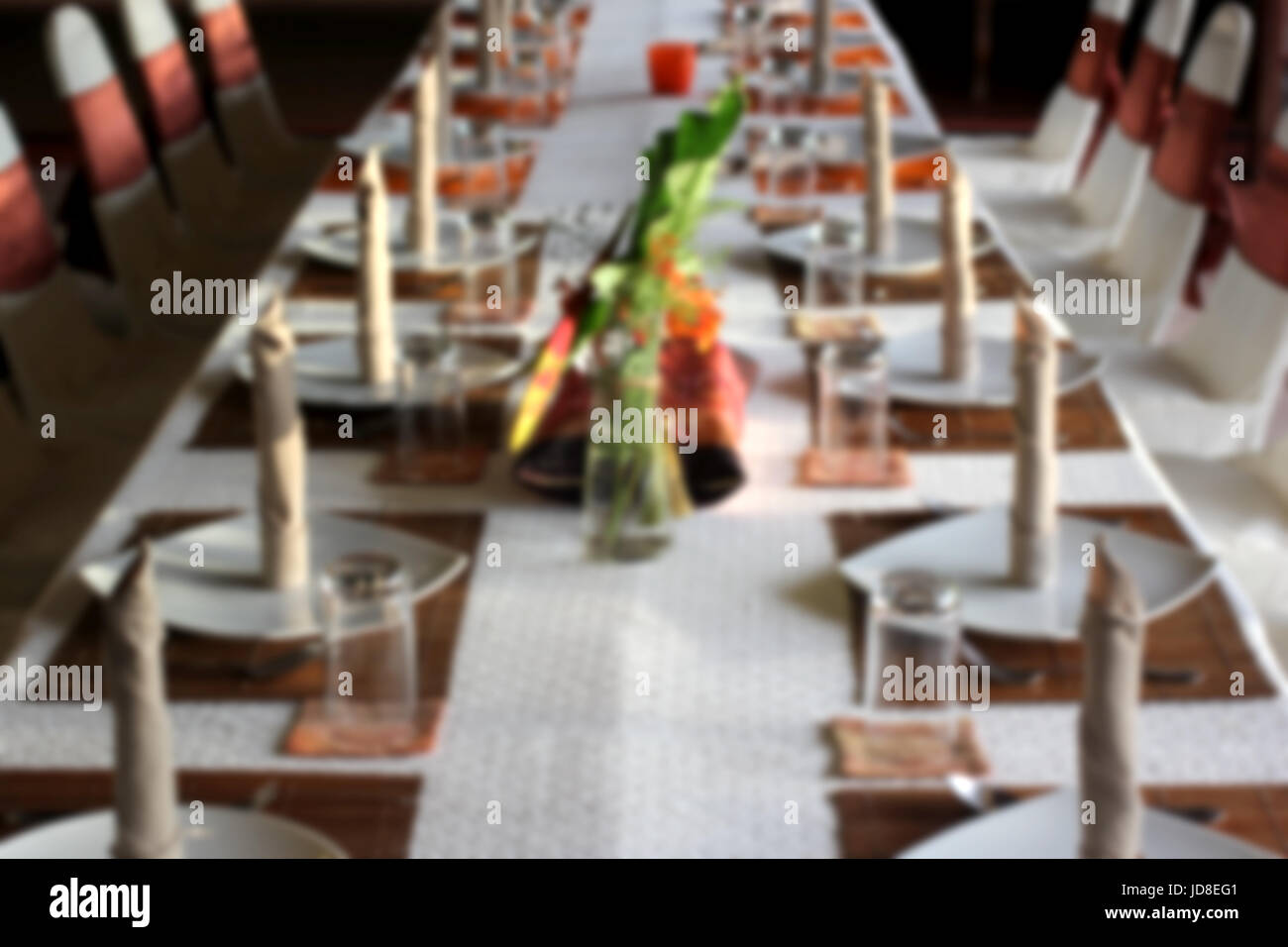 blurry photo of restaurant dinner table setting Stock Photo - Alamy