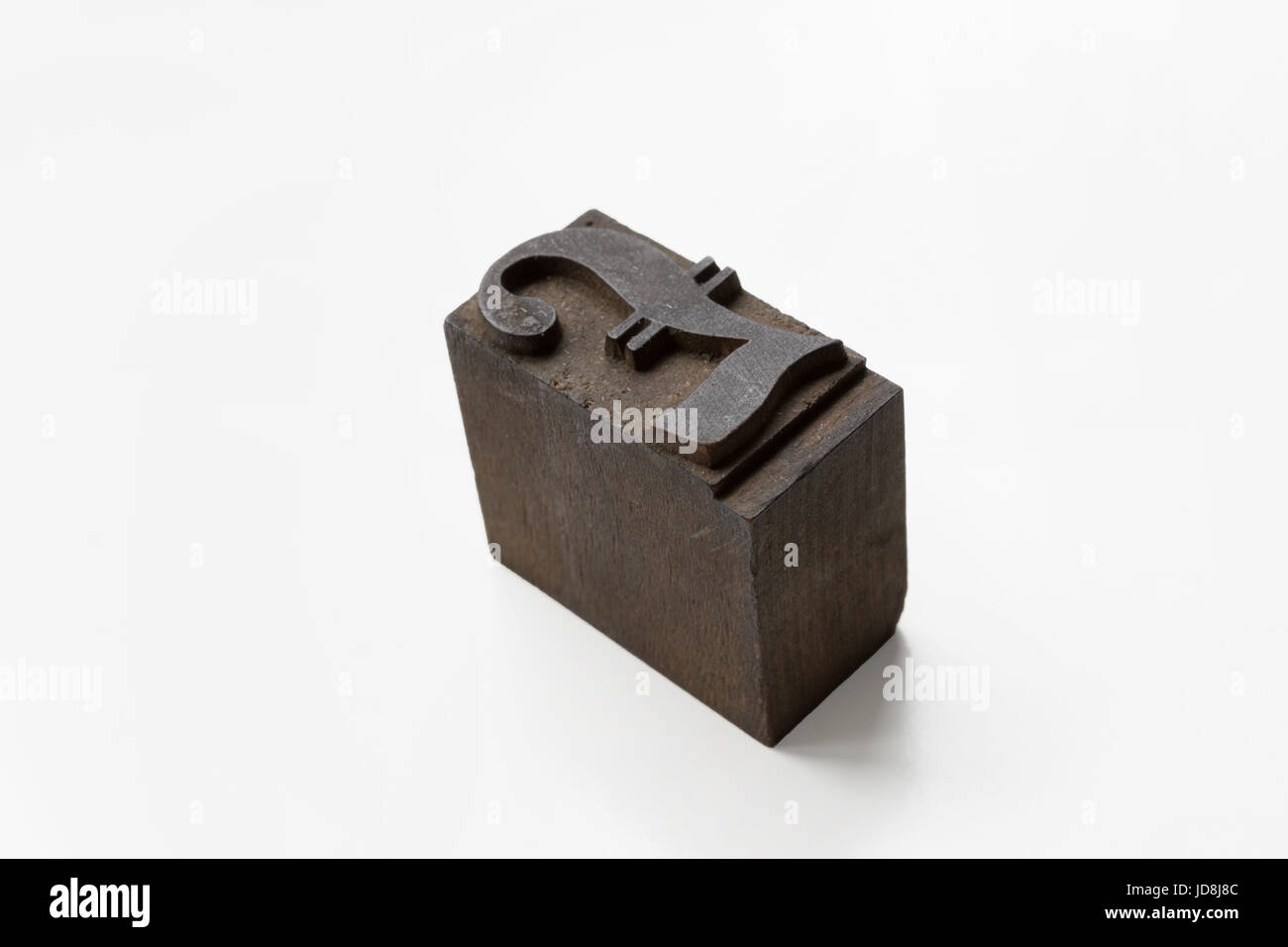 Old letterpress pound sign printing block isolated on a white ...