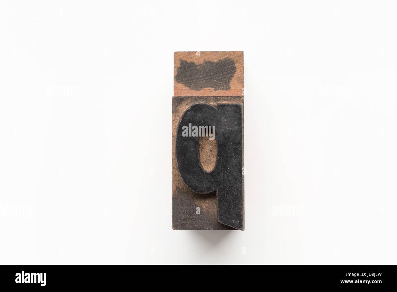 Old letterpress letter printing block isolated on a white background ...
