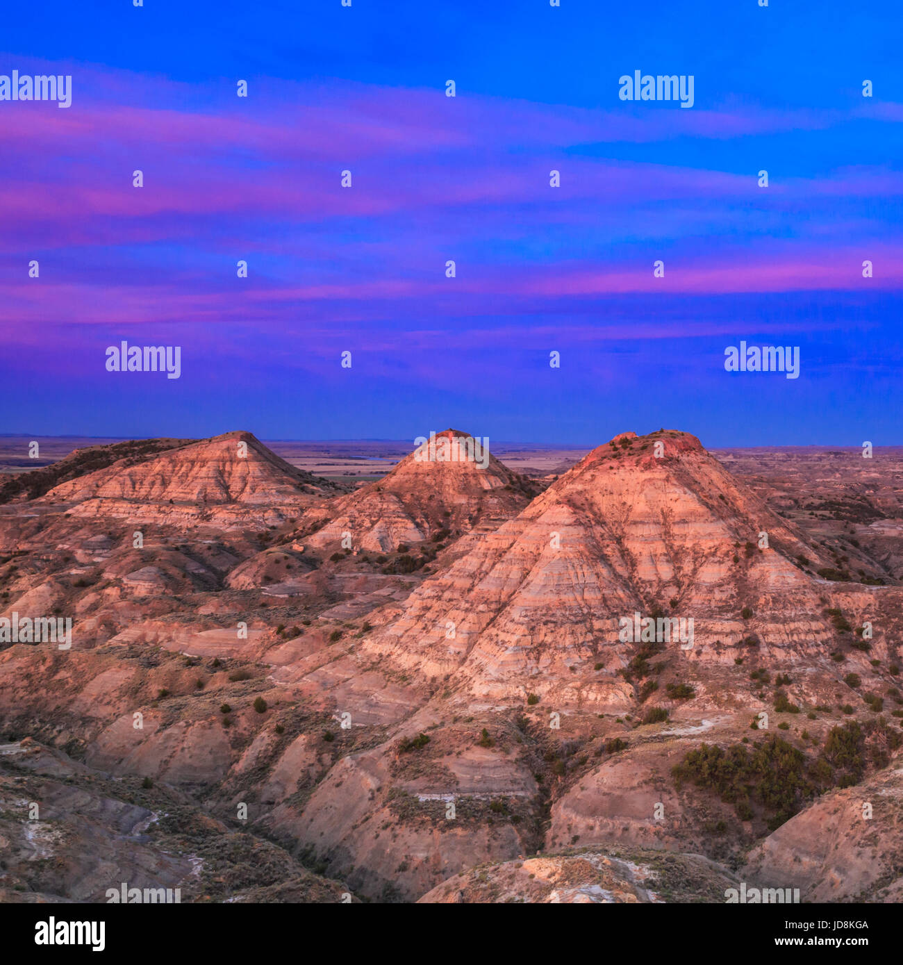 sunrise over haystack buttes in the terry badlands near terry, montana ...