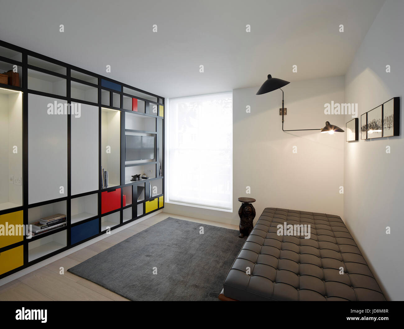 Spare room on 1st floor with Mondrian inspired bookcase and Corbusier ...