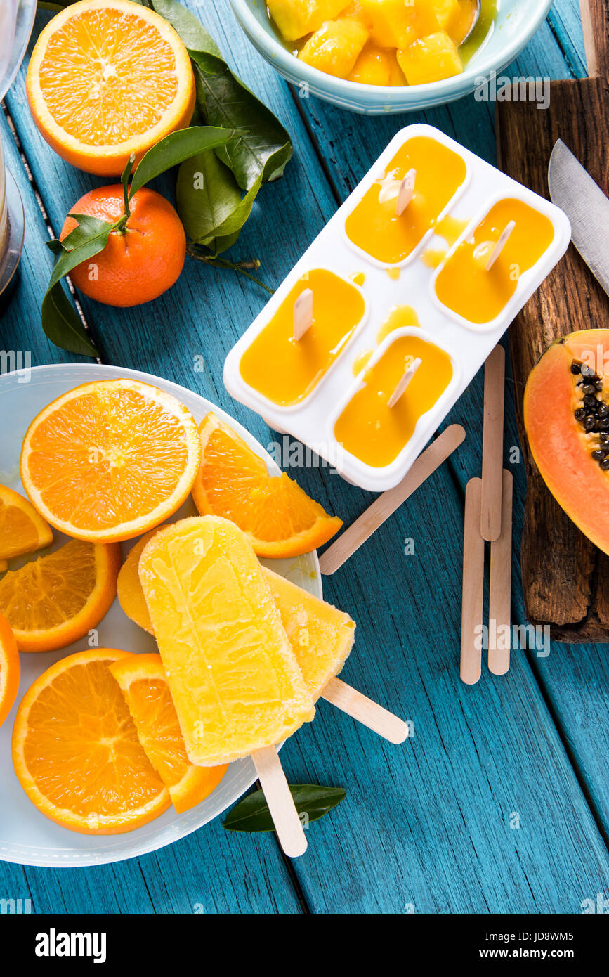 Orange juice homemade popsicle Stock Photo - Alamy