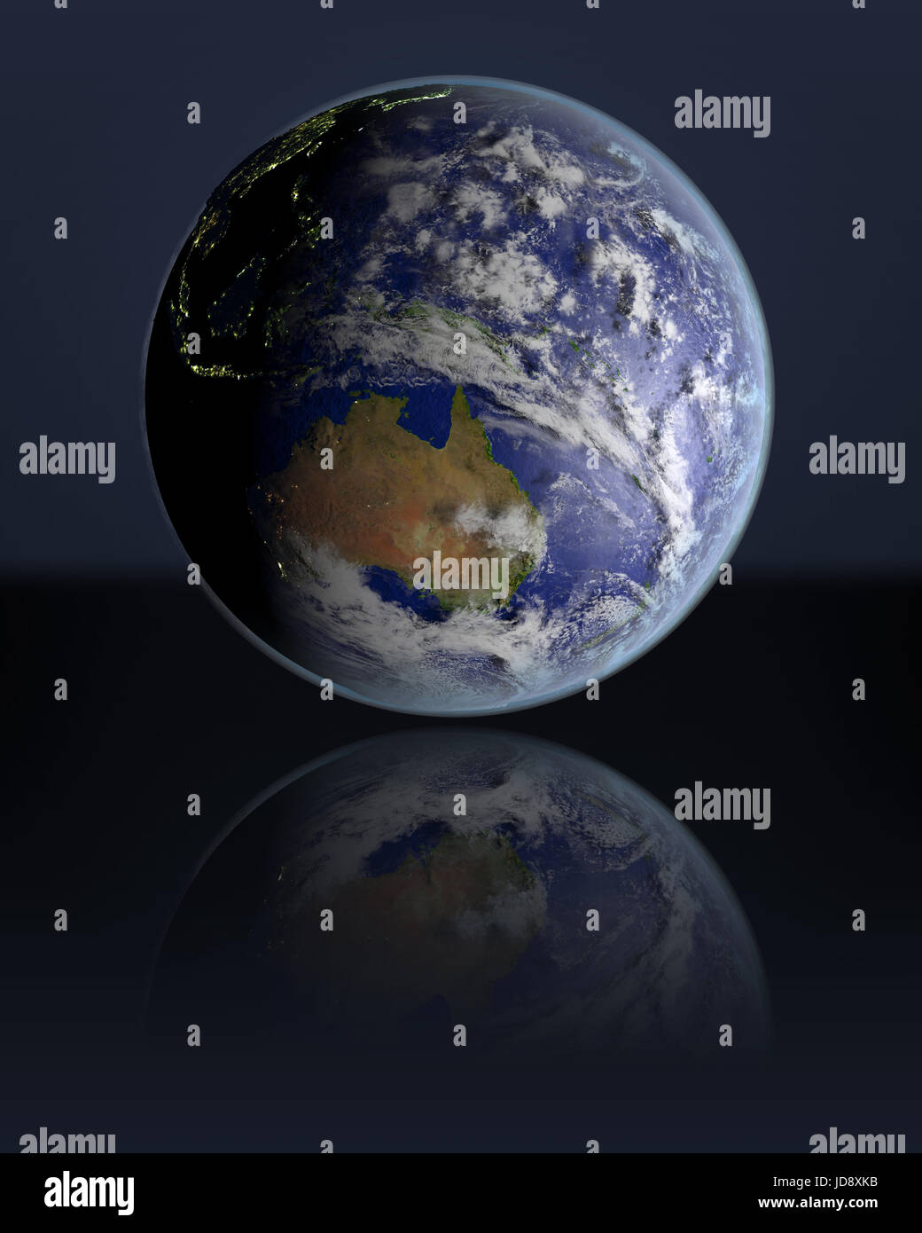 Planet Earth hovering above dark reflective surface facing Australia ...