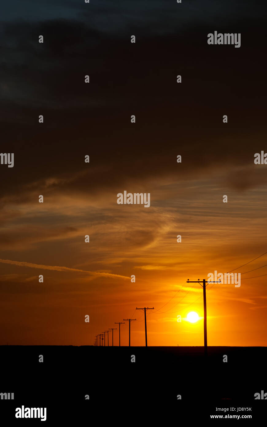 hydro poles in prairie sunset Stock Photo - Alamy