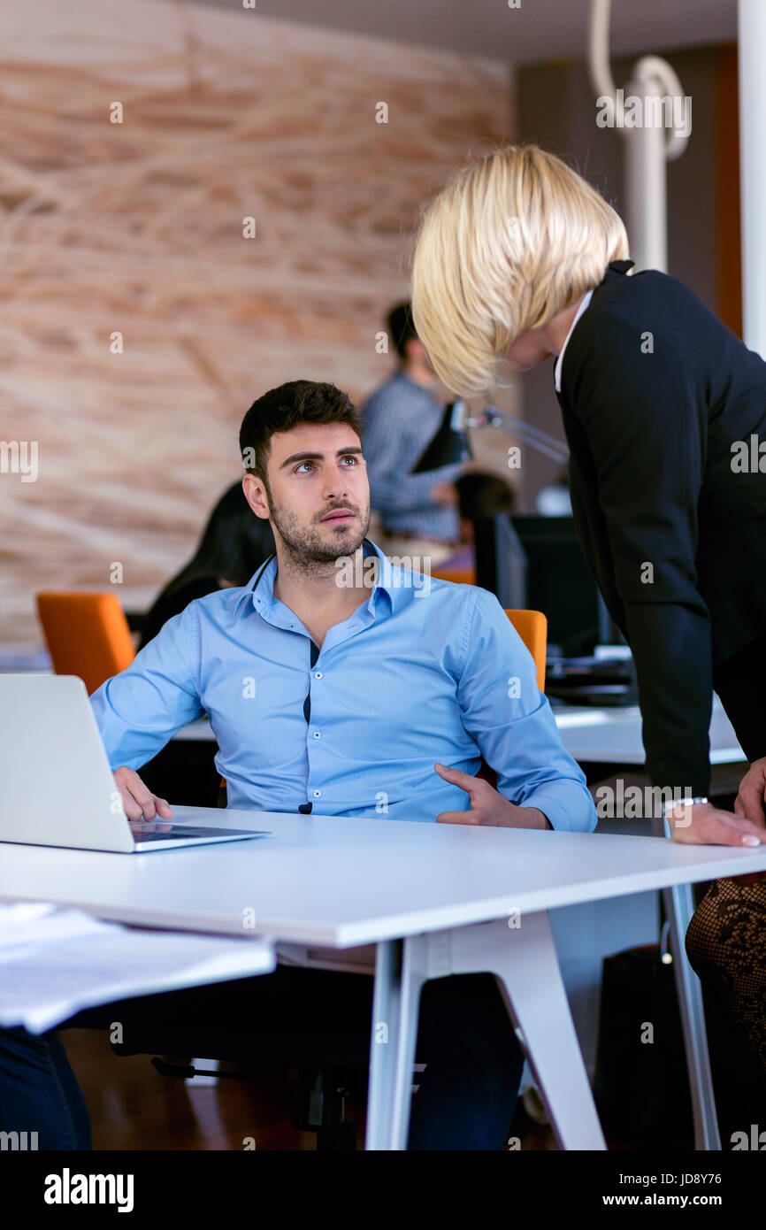 Boss scolding a shameful employee at work in an office Stock Photo - Alamy