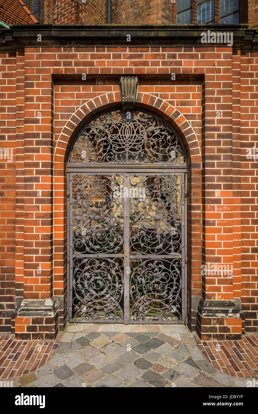 Wrought-iron gate with floral patterns Stock Photo - Alamy